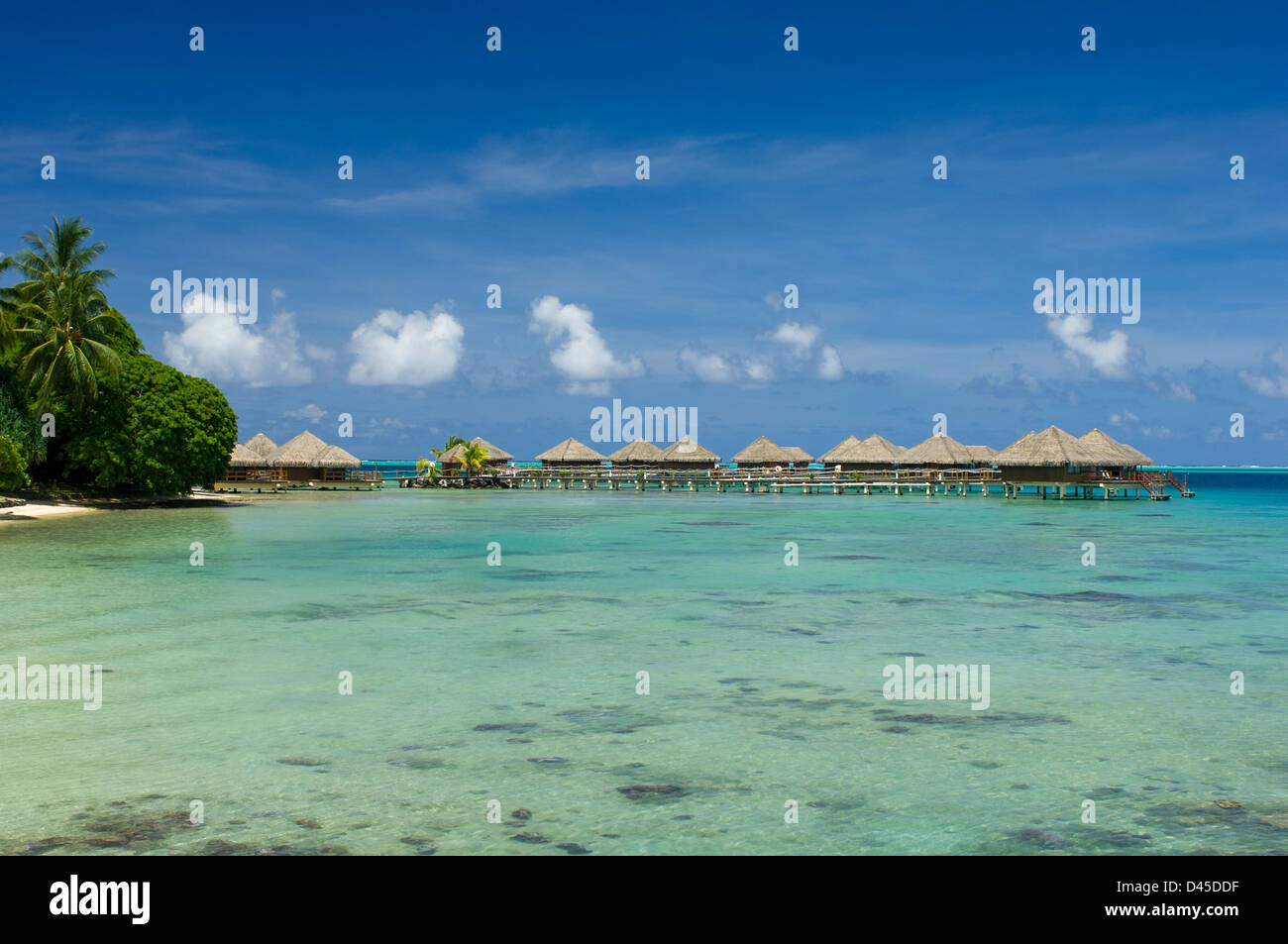 Huts built out over the lagoon, Te Tiare Beach Resort, Huahine, French ...