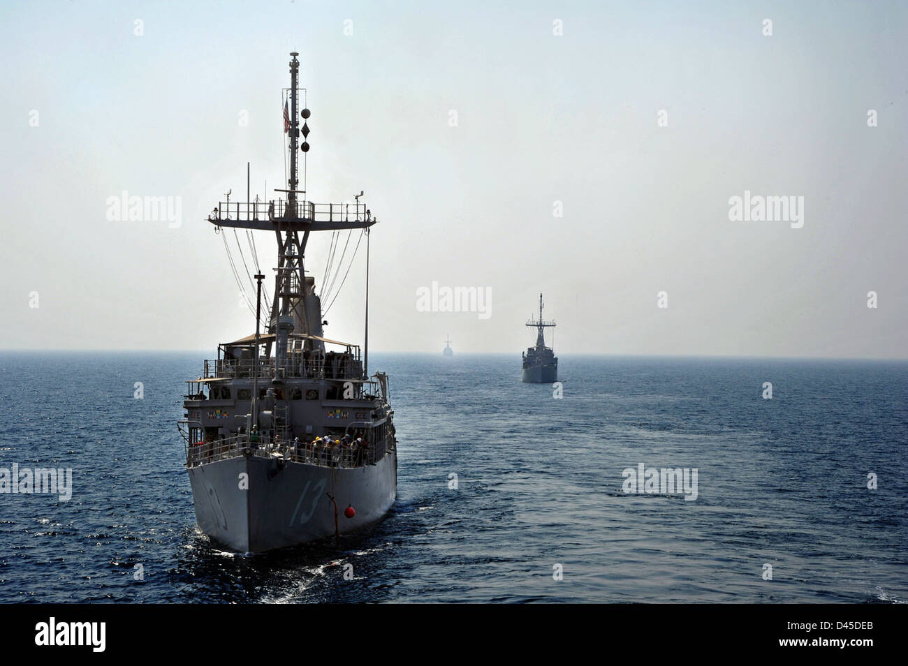 Sailors haul in a refueling line Stock Photo - Alamy