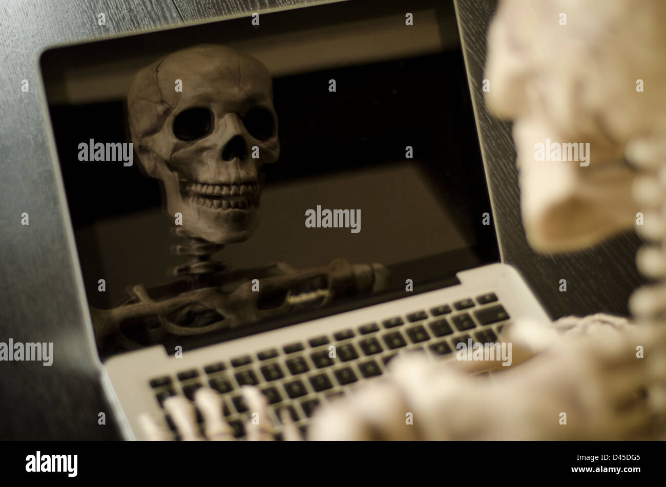 Skeleton at computer hi-res stock photography and images - Alamy