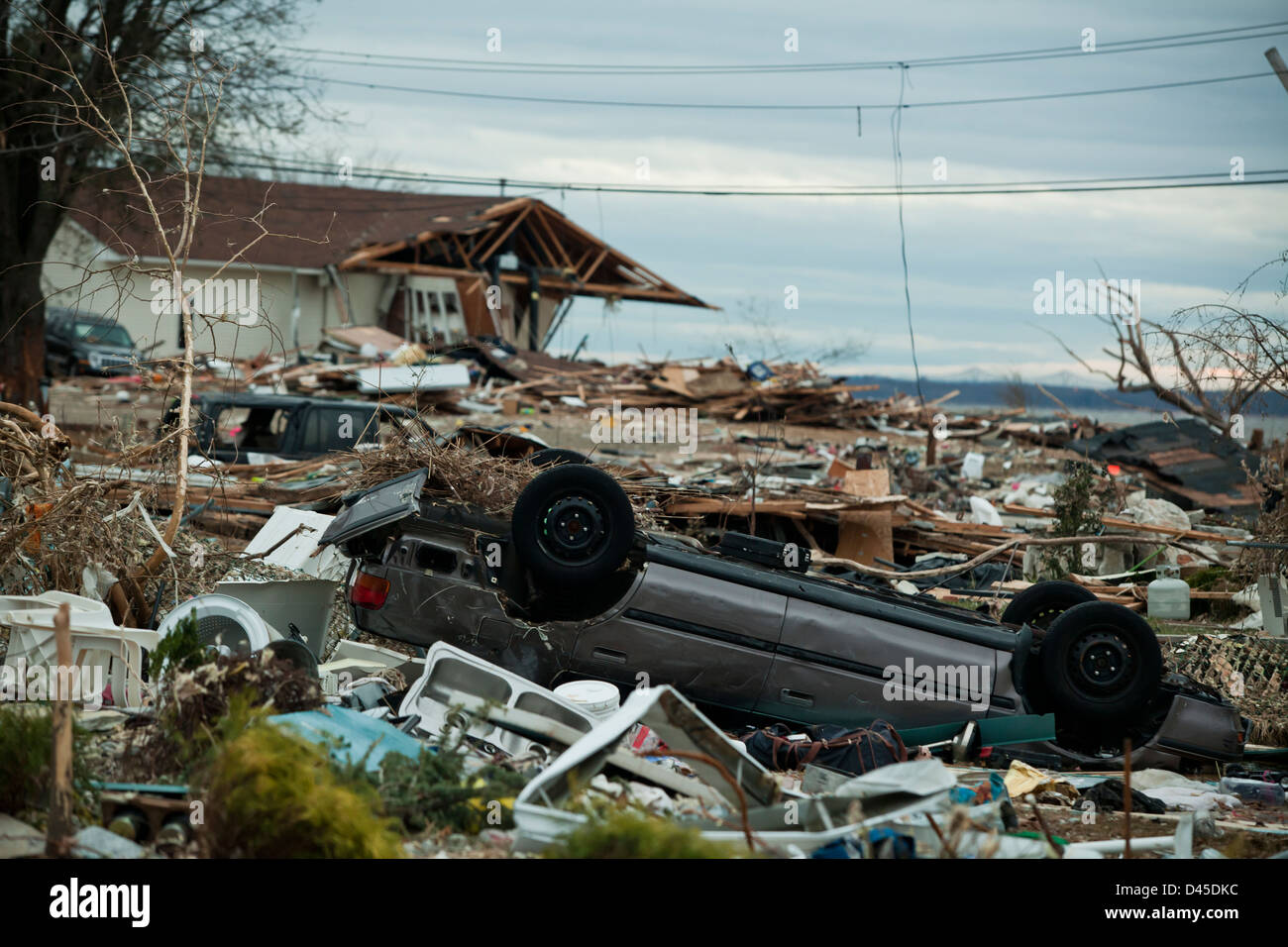 Wreckage from Superstorm Sandy - including cars, roofs, house-walls and ...