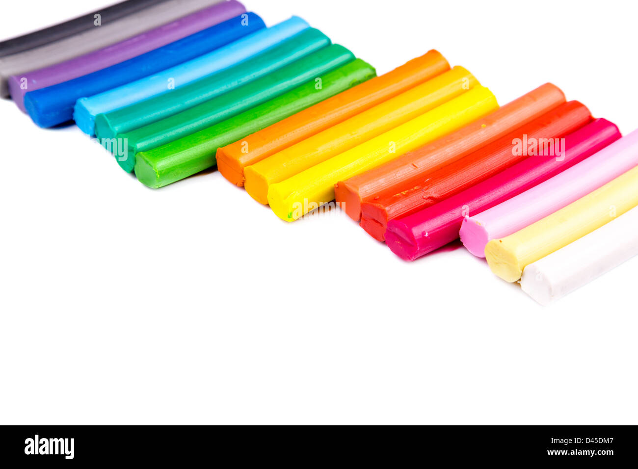 Rainbow colors plasticine bars, modeling clay isolated over white with ...