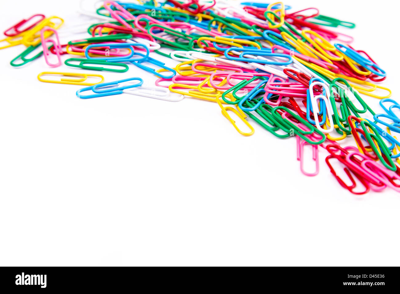 Multicolored paper clips isolated on white background with copy space ...