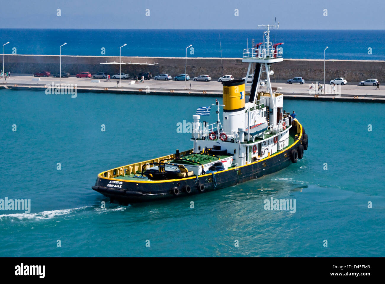 tug boat with yellow funnel Stock Photo - Alamy