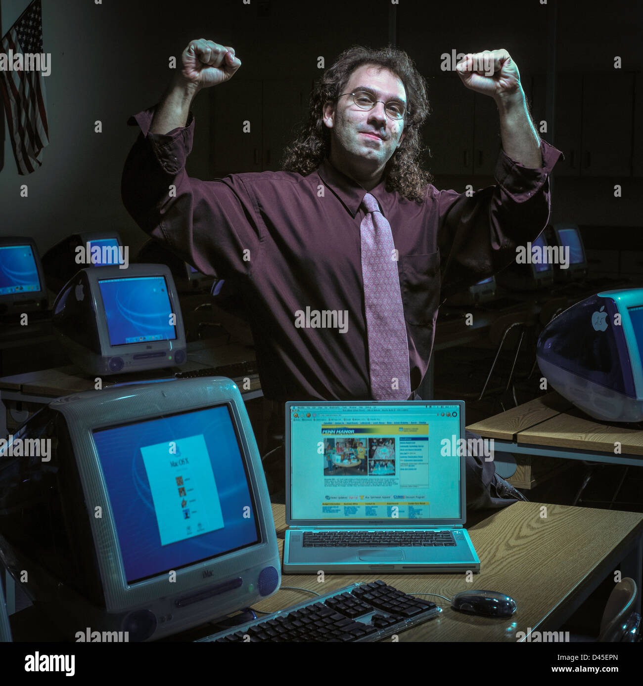 Teacher in computer lab Stock Photo - Alamy
