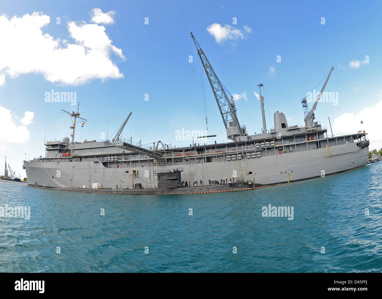 The USS Frank Cable provides logistical support to the USS Oklahoma ...