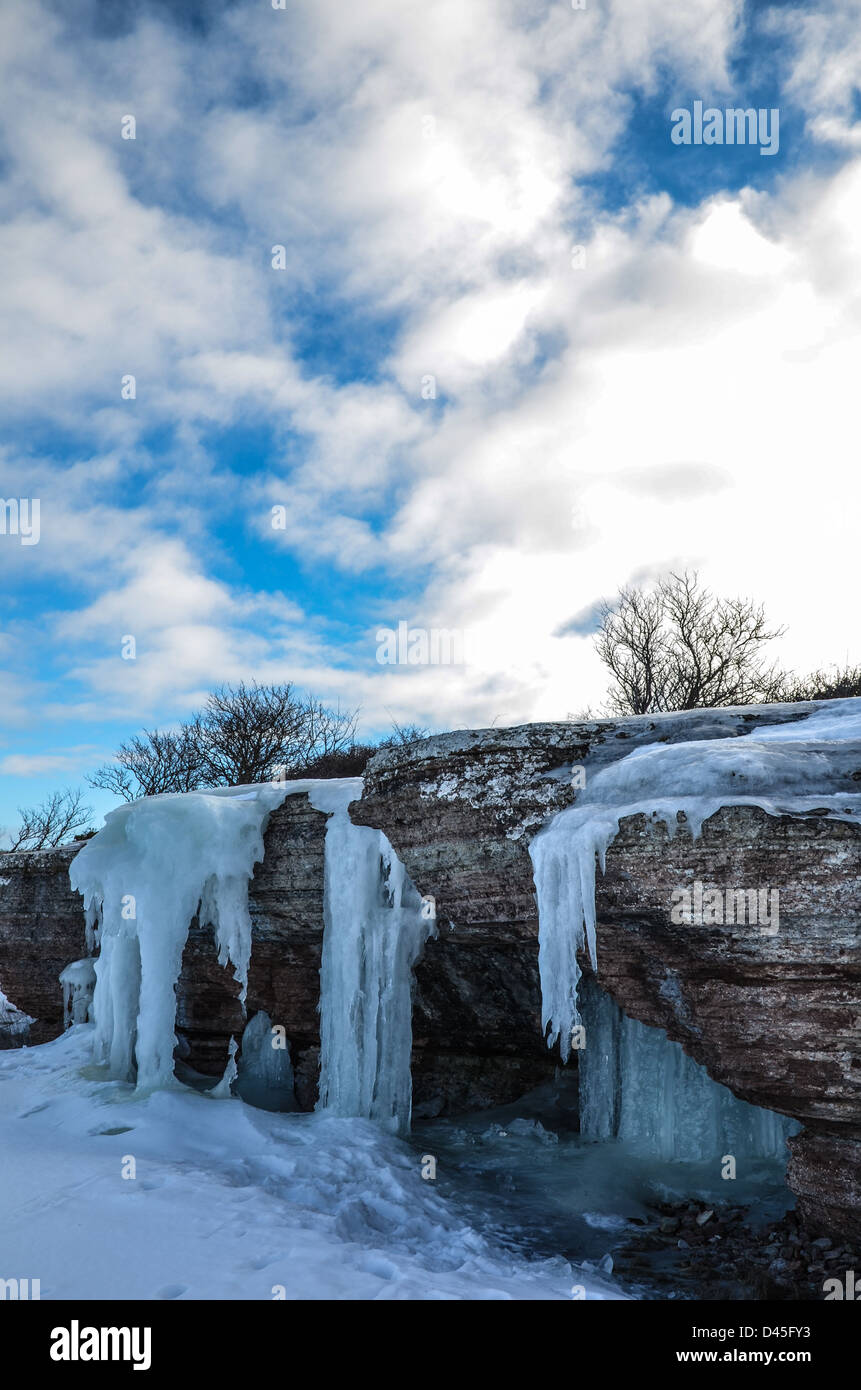 Icy limestone cliffs at the coast of the swedish island Öland in the ...