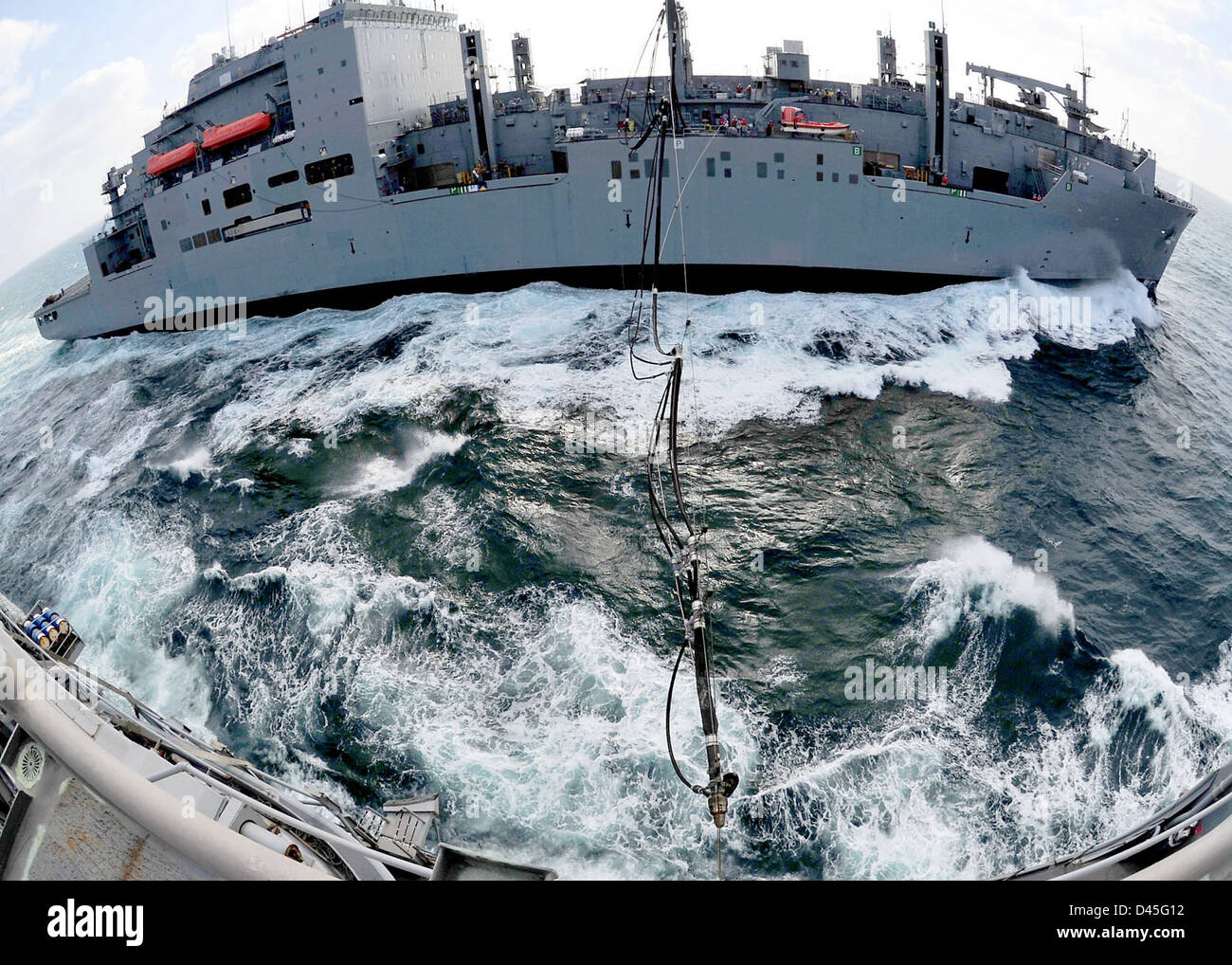 USNS Washington Chambers conducts a replenishment-at-sea operation in ...