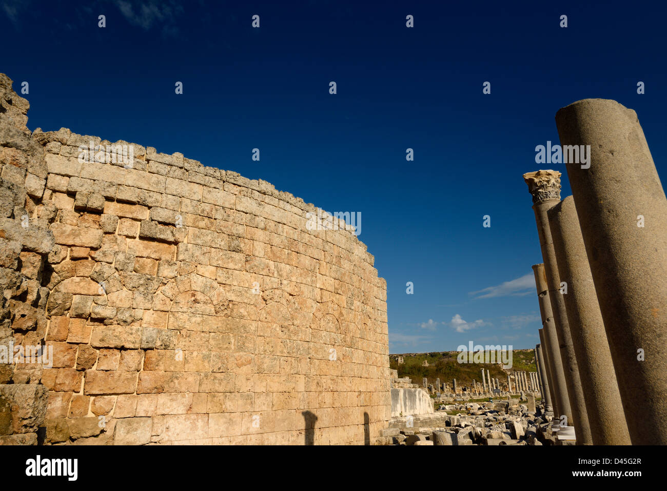 Main street colonnade with water canal from Greek Gate with collection ...