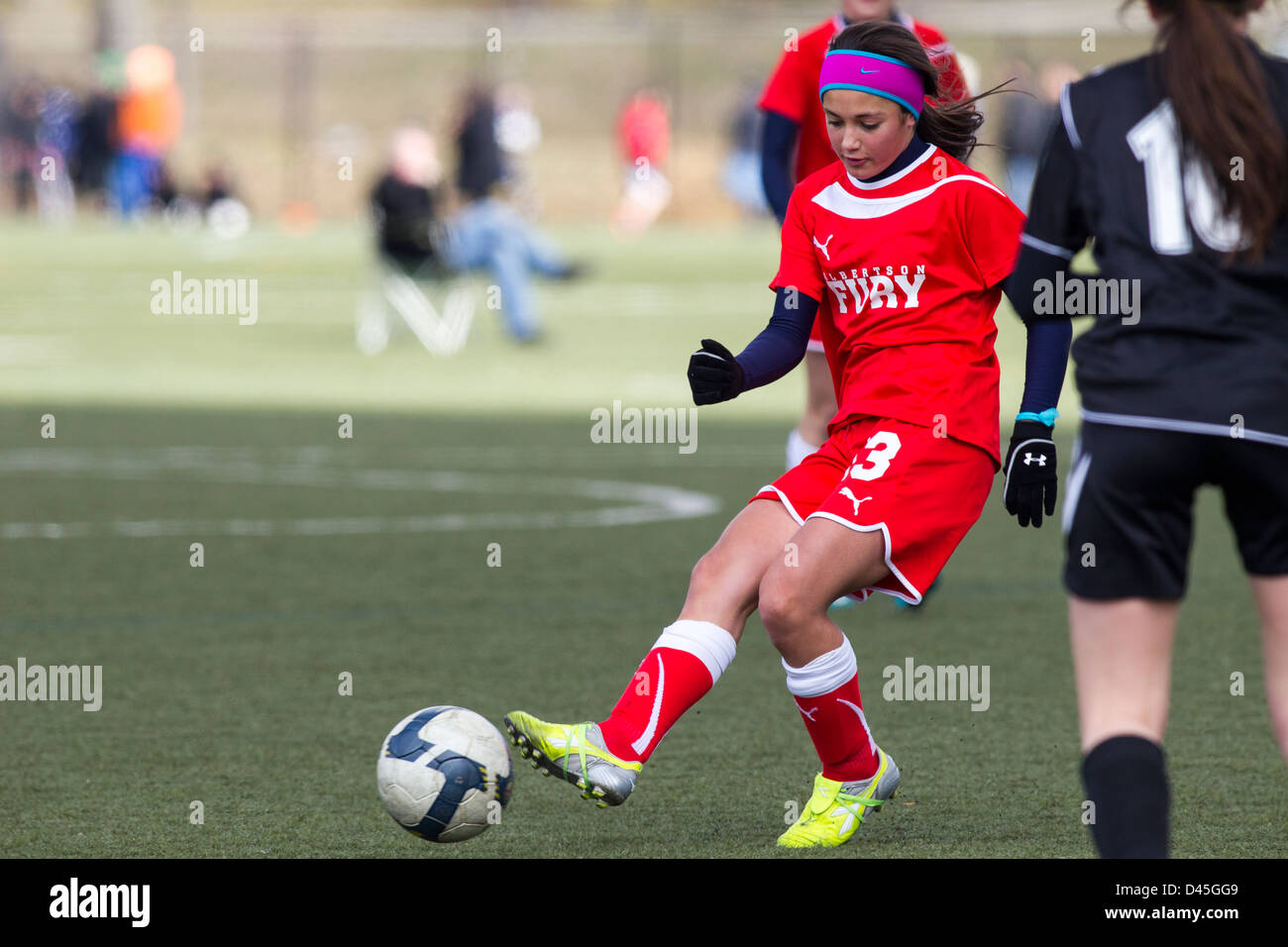 Teen girls soccer action Stock Photo - Alamy