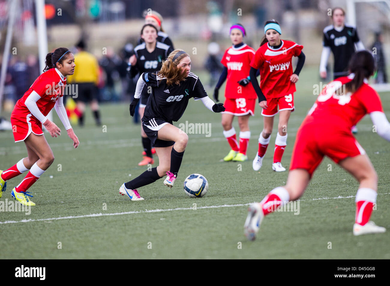 Teen girls soccer action Stock Photo - Alamy