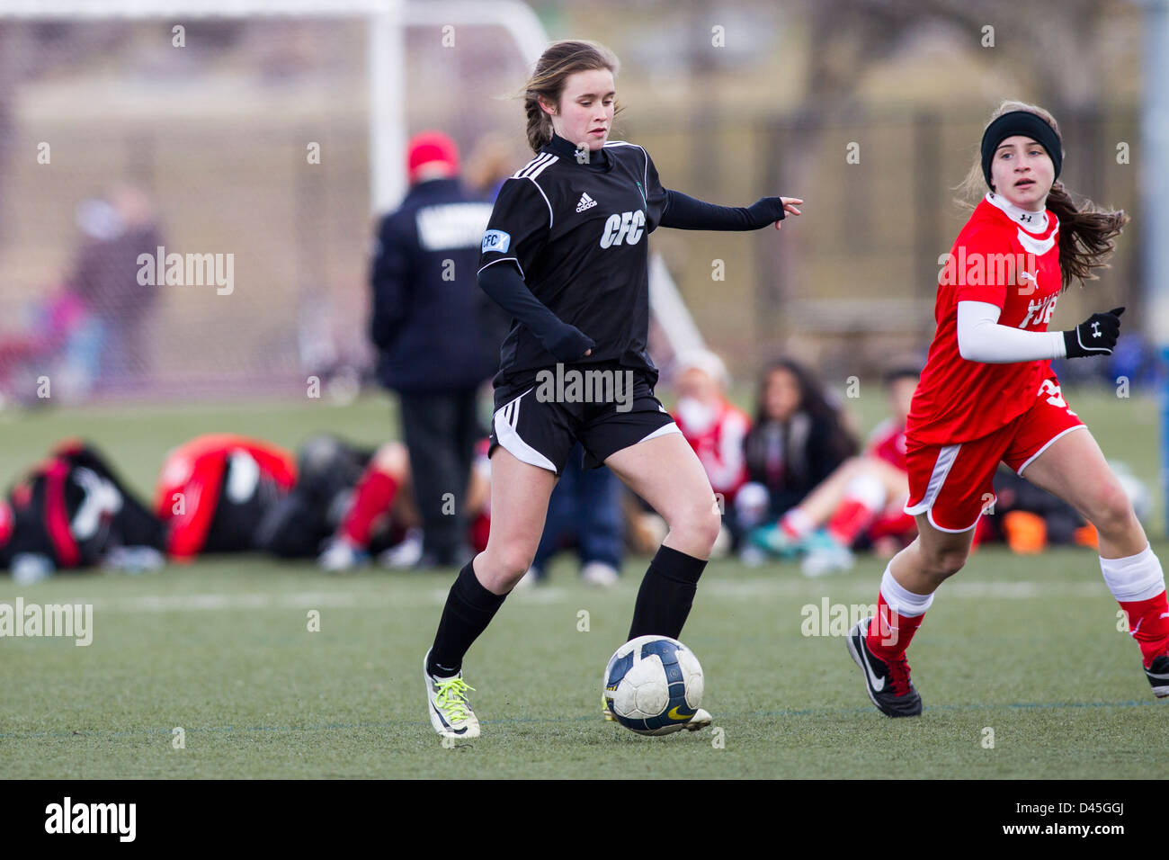Teen girls soccer action Stock Photo - Alamy