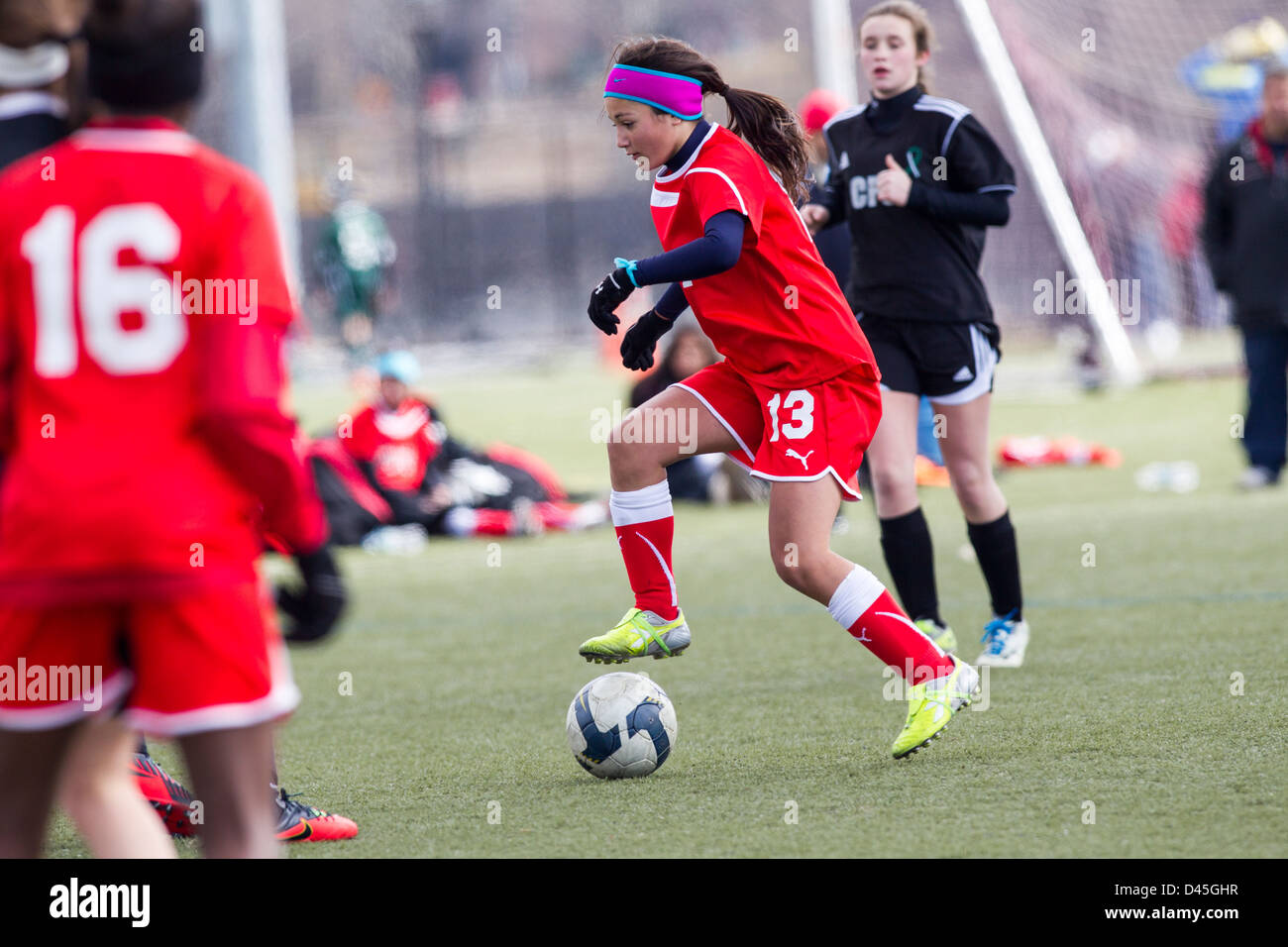 Teen girls soccer action Stock Photo - Alamy