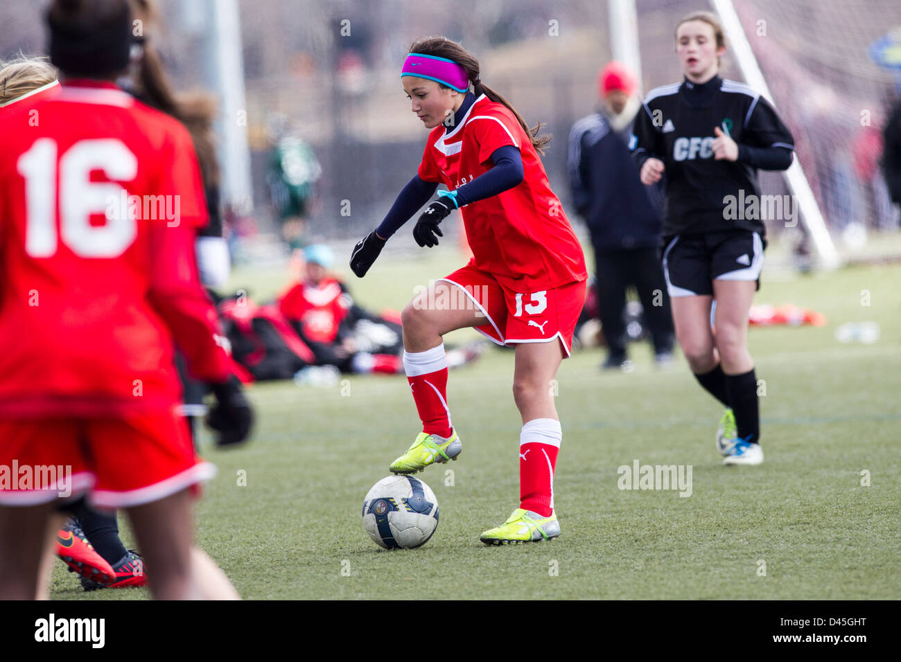 Teen girls soccer action Stock Photo - Alamy