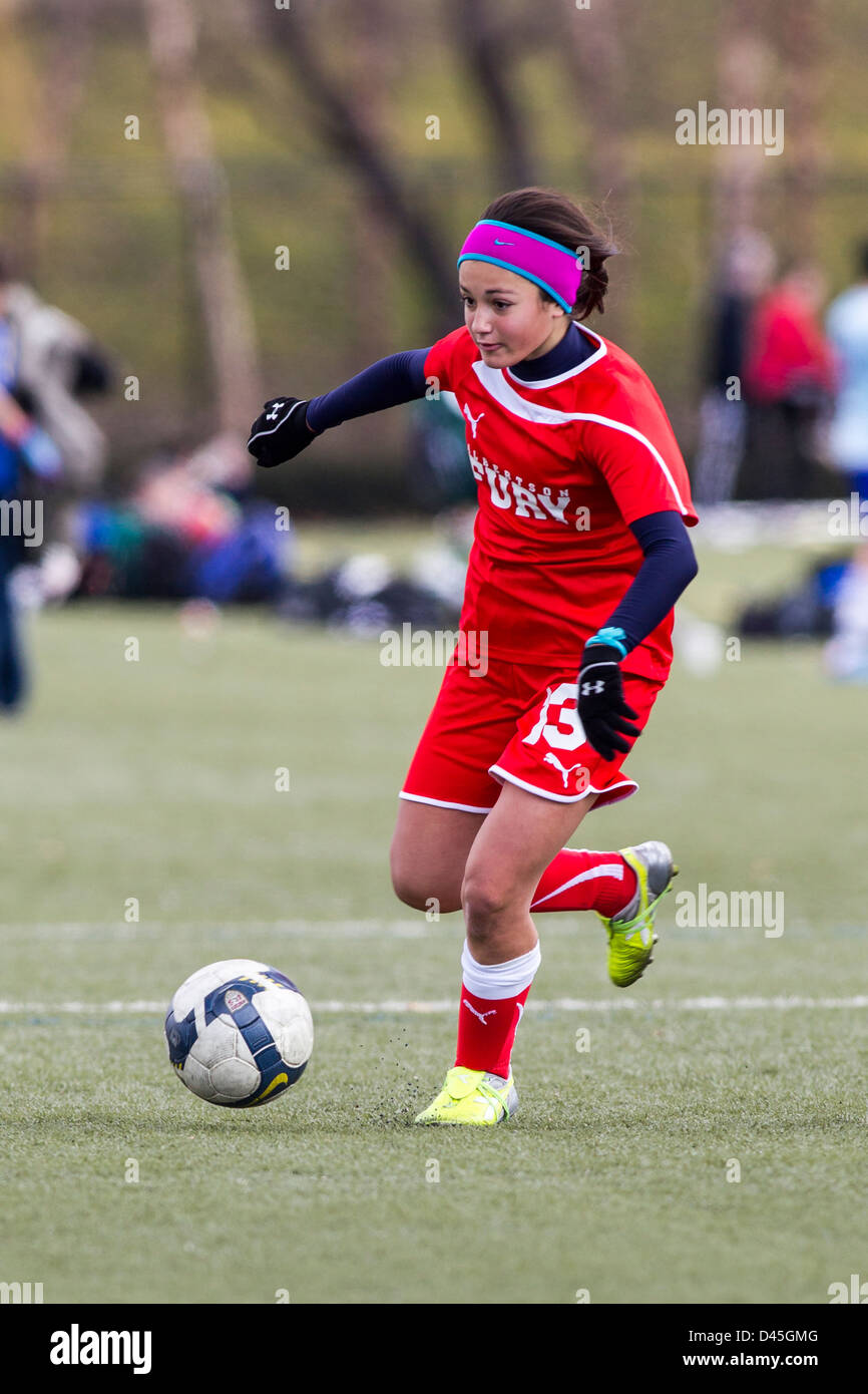 Teen girls soccer action Stock Photo - Alamy