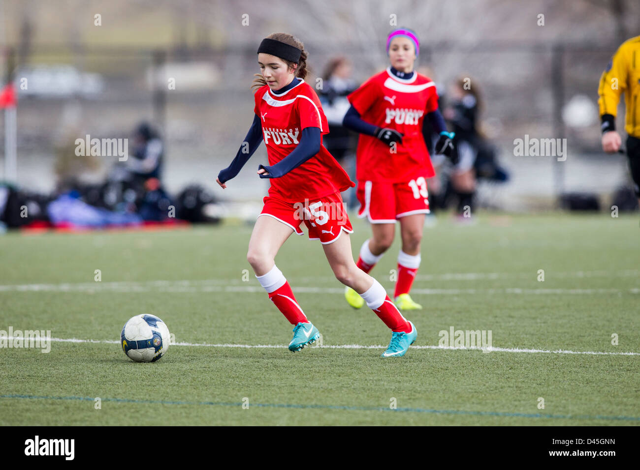 Teen girls soccer action Stock Photo - Alamy