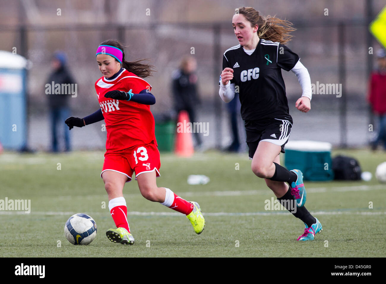Teen girls soccer action Stock Photo - Alamy