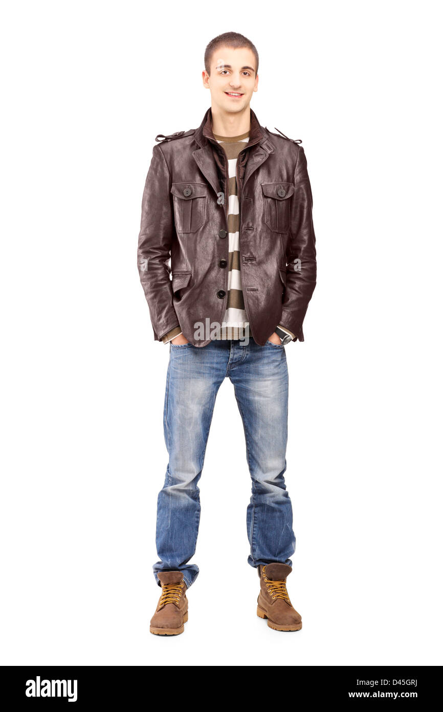 Full length portrait of a young smiling man posing isolated on white ...