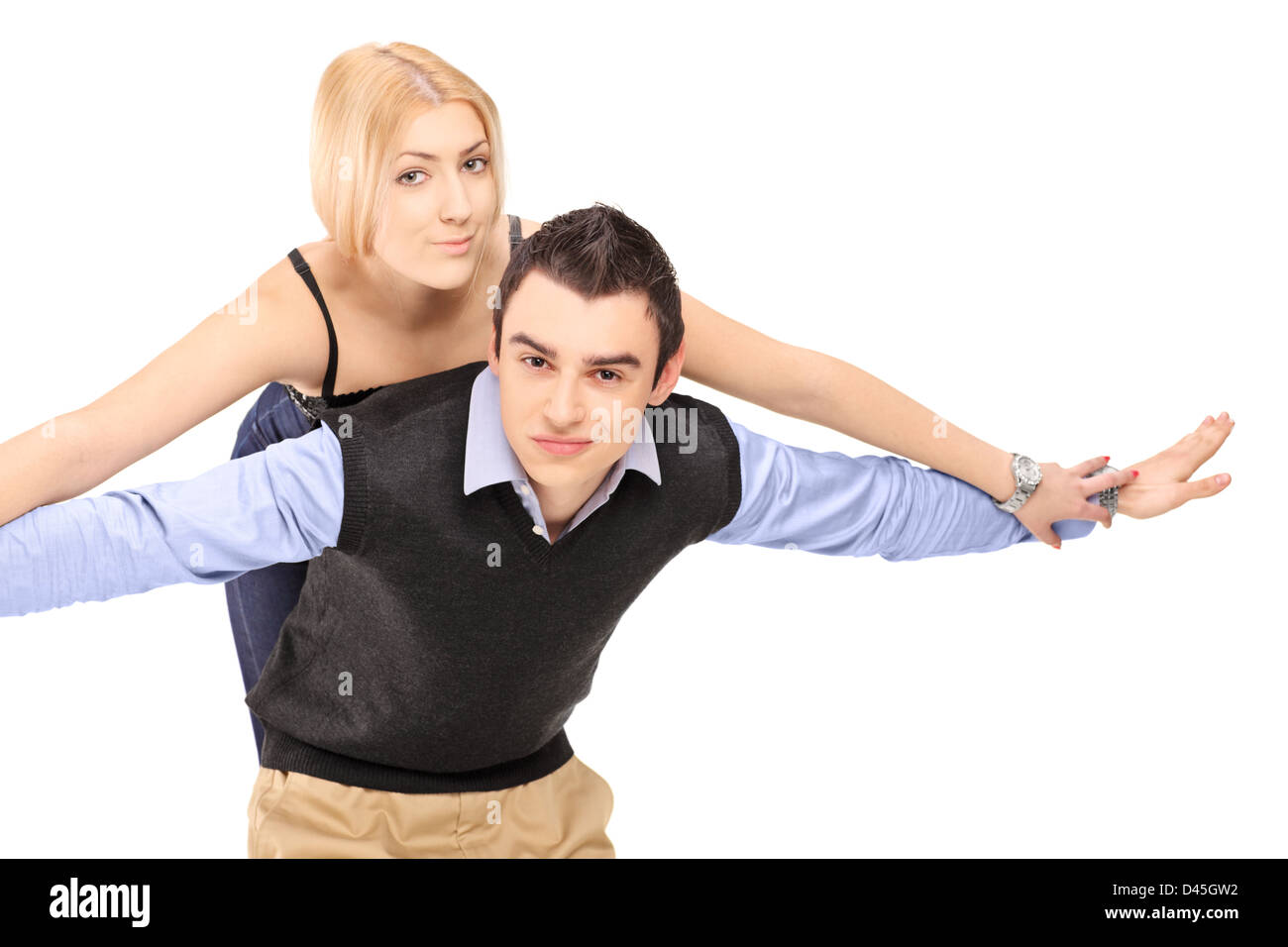 Happy young couple posing piggyback isolated on white background Stock ...