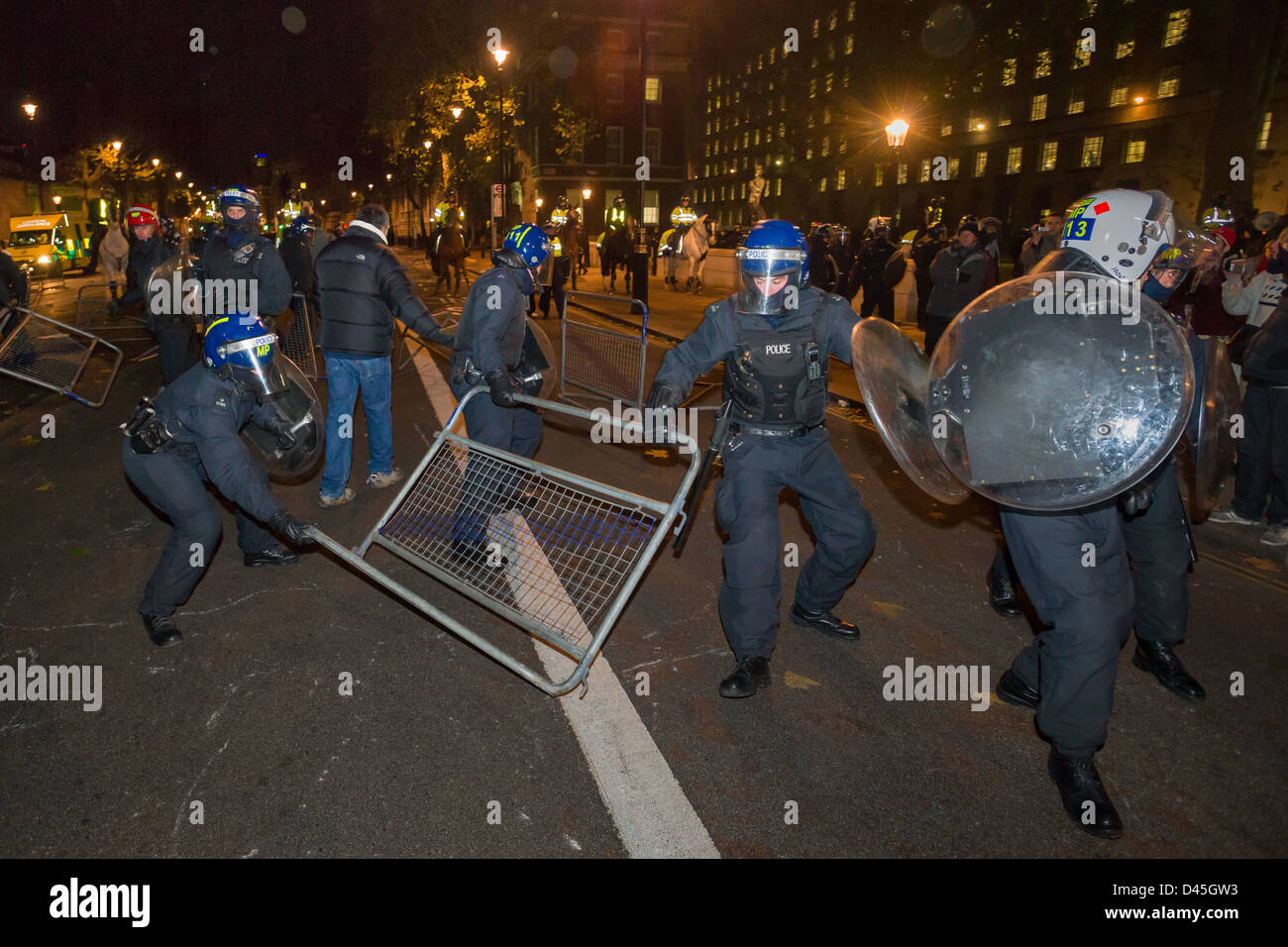 Police officer on duty holding conflict security hi-res stock ...