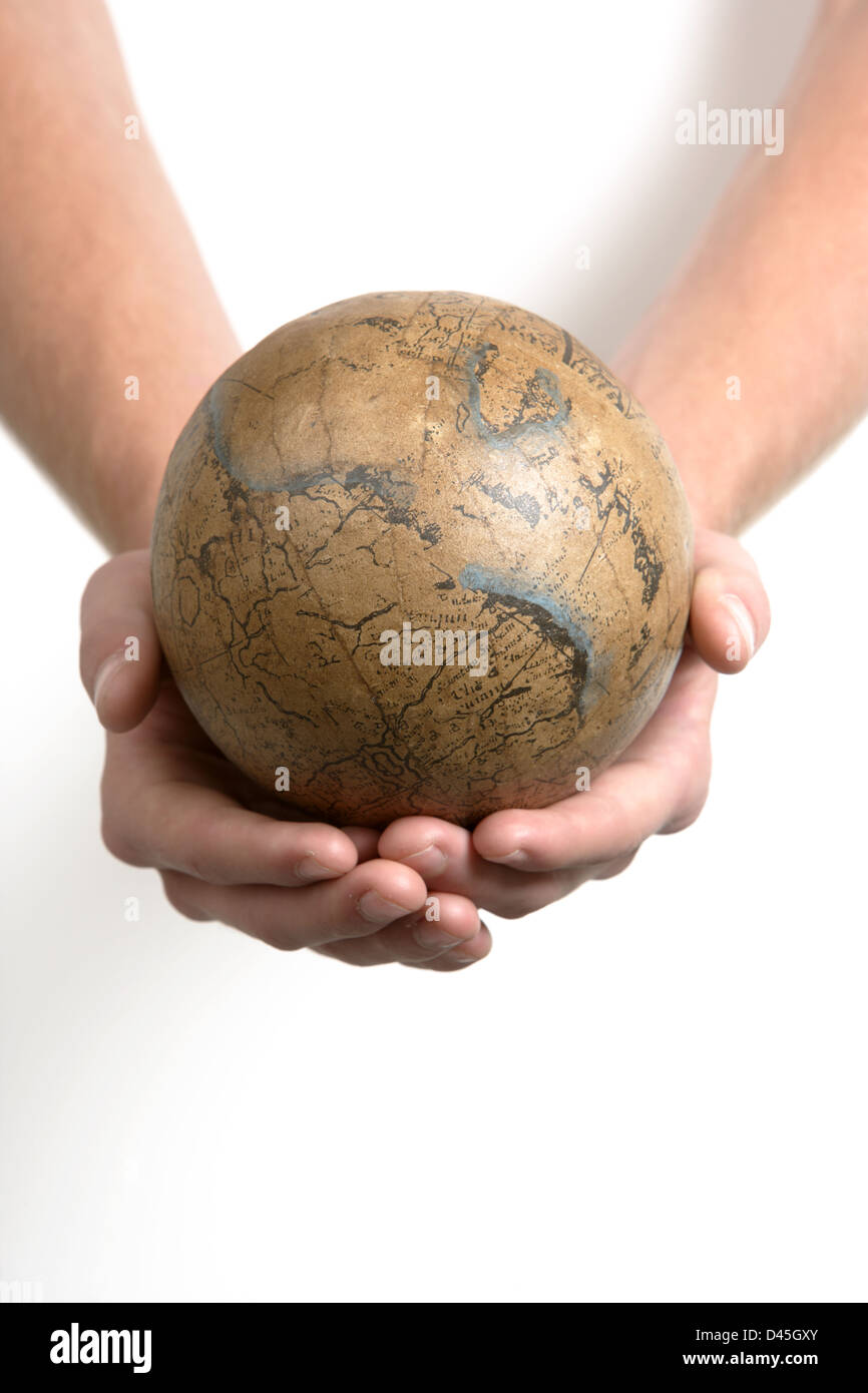 A person holding the world in there hand Stock Photo - Alamy