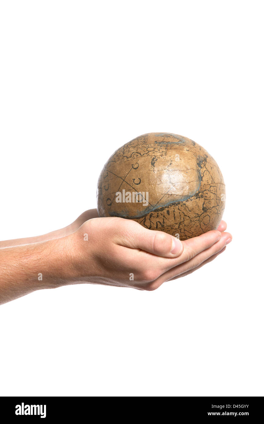 Globe world in palm hand Cut Out Stock Images & Pictures - Alamy