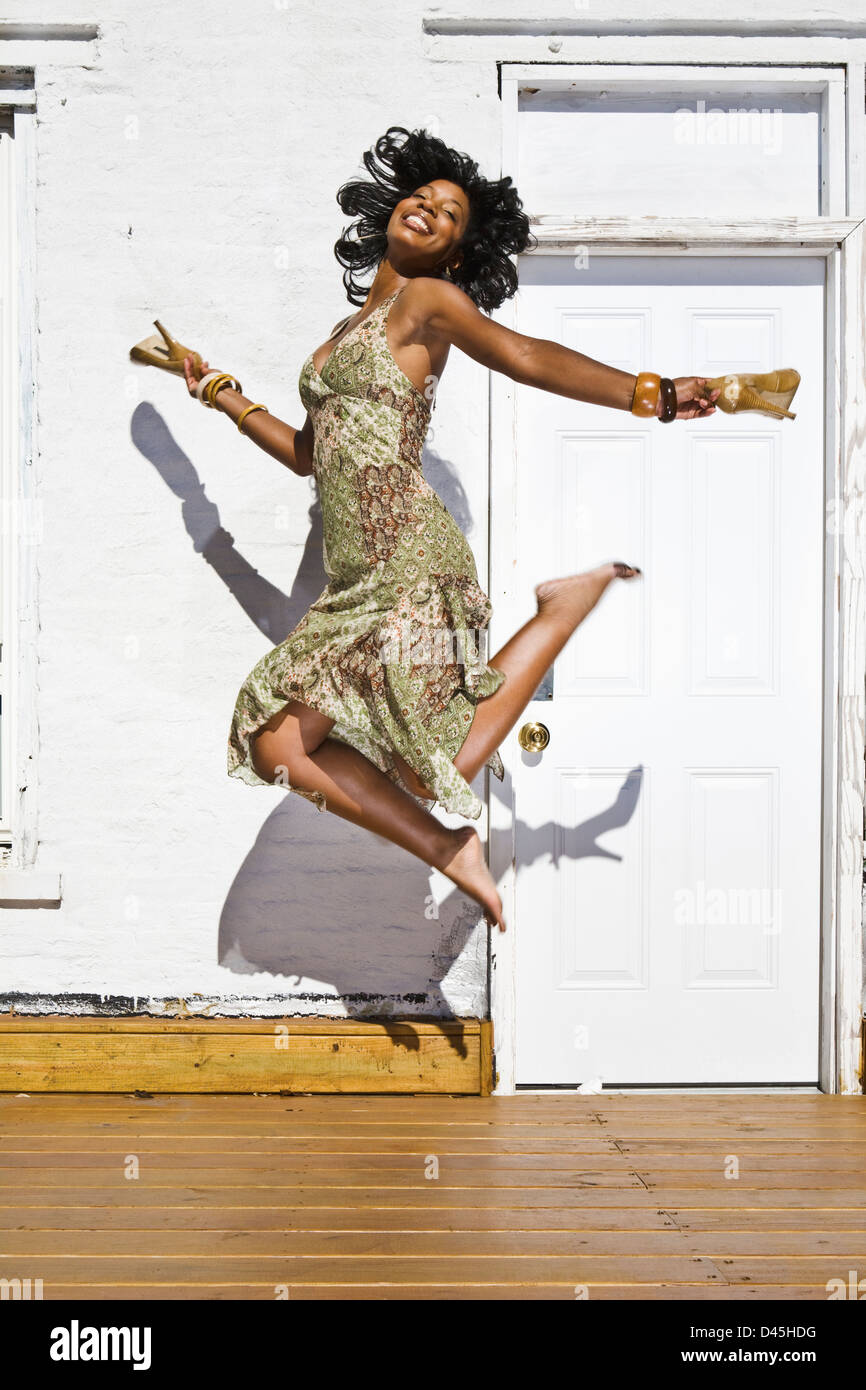 Black Woman Jumping For Joy