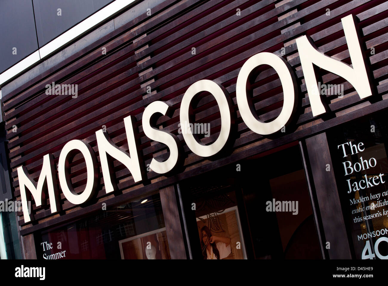 Sign for women's clothing shop Monsoon Stock Photo - Alamy