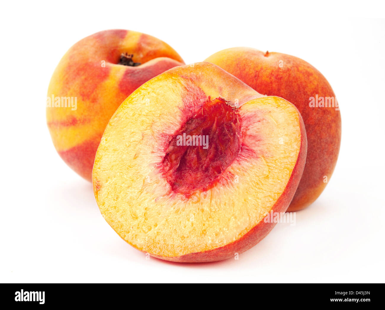 Open peach fruit isolated on white Stock Photo - Alamy