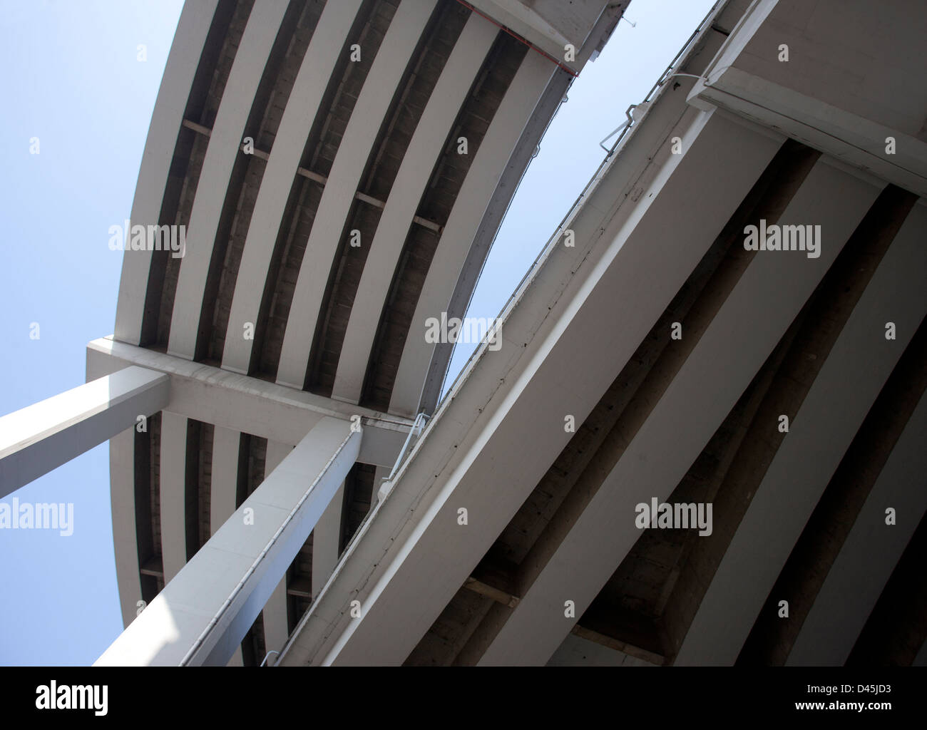 elevated road building crossed overhead with blue sky Stock Photo - Alamy
