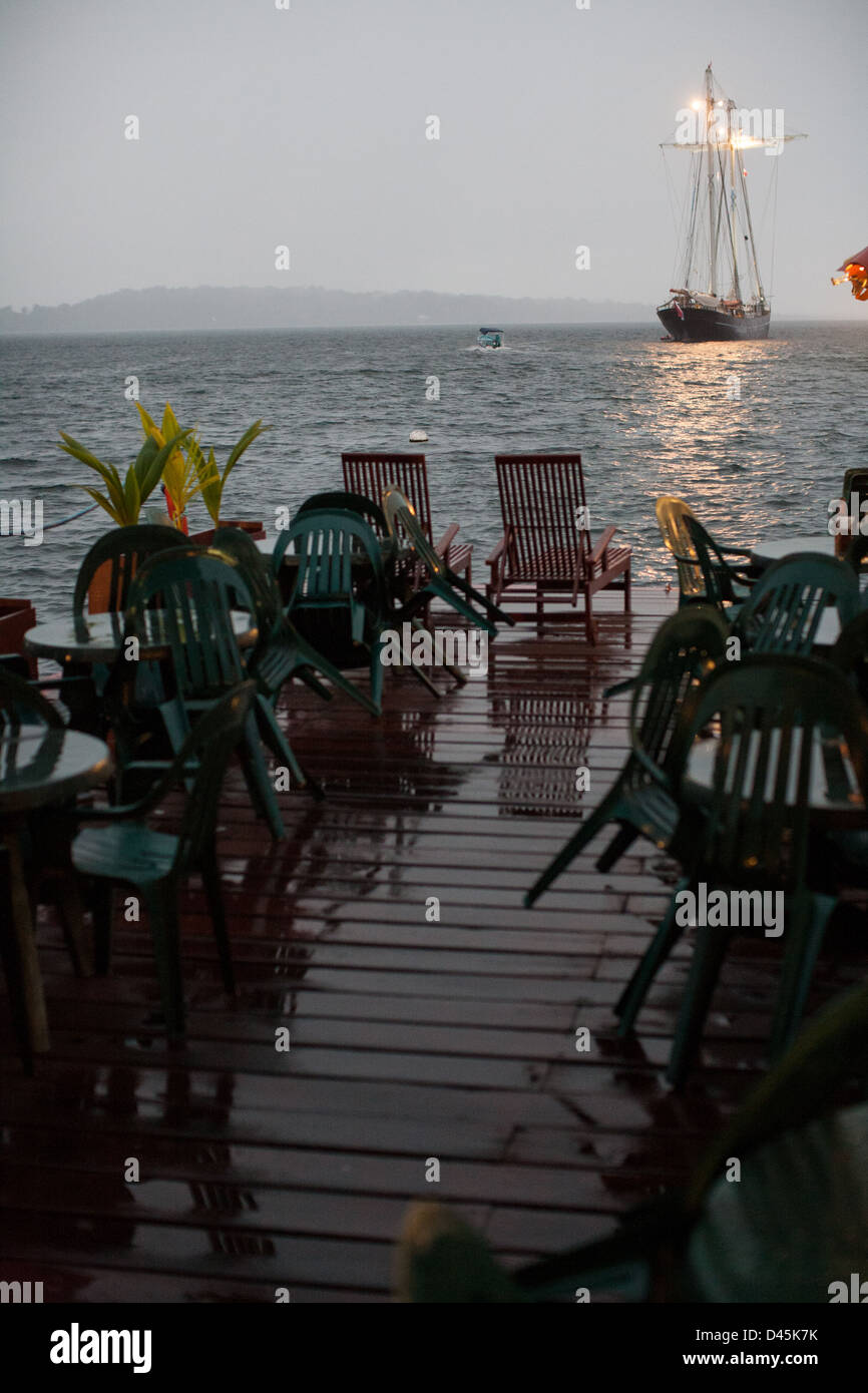 Maritime sailboat floating in the Caribbean Sea lit by the moonlight ...