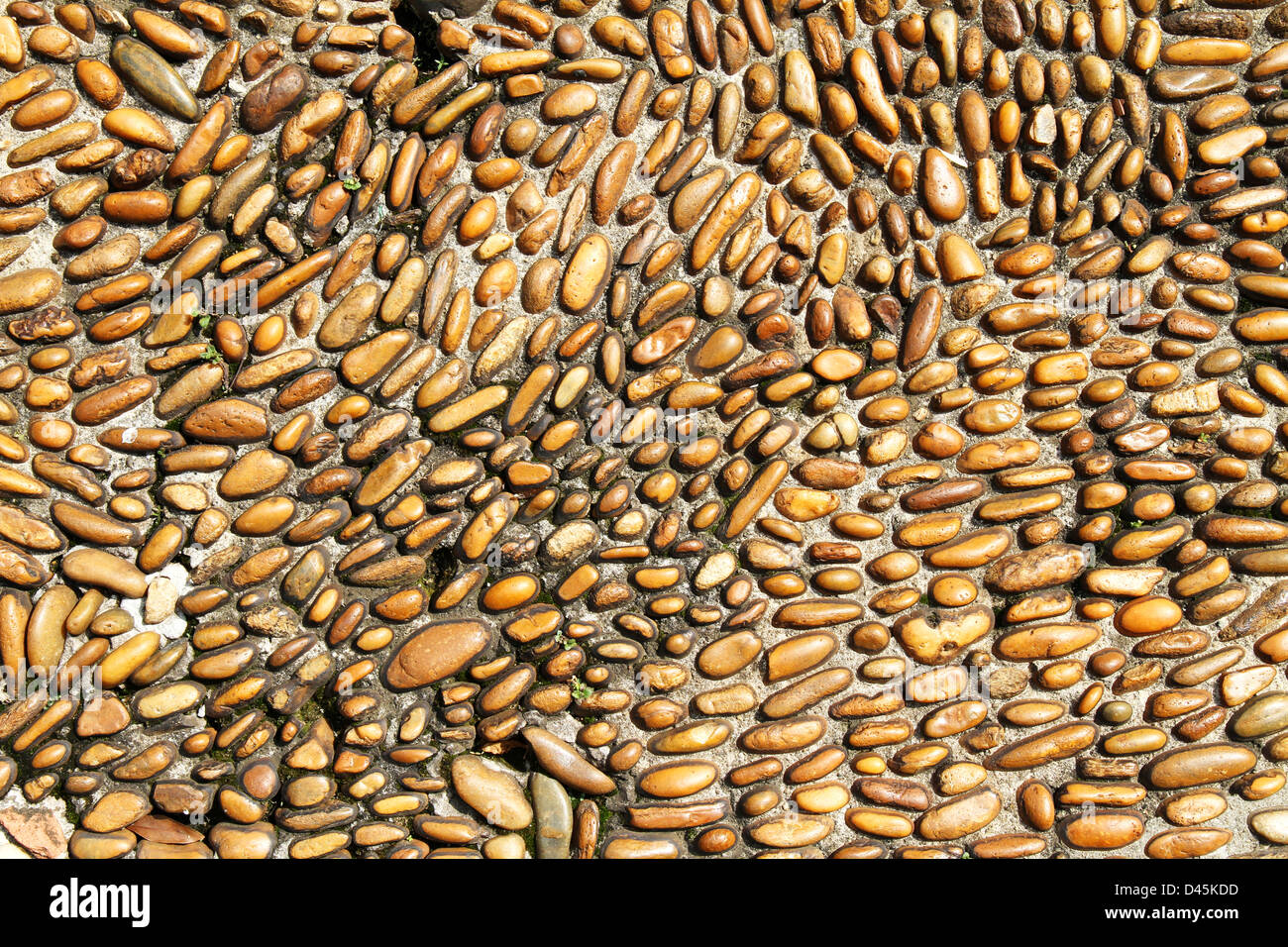 Background of a pebblestone floor Stock Photo - Alamy