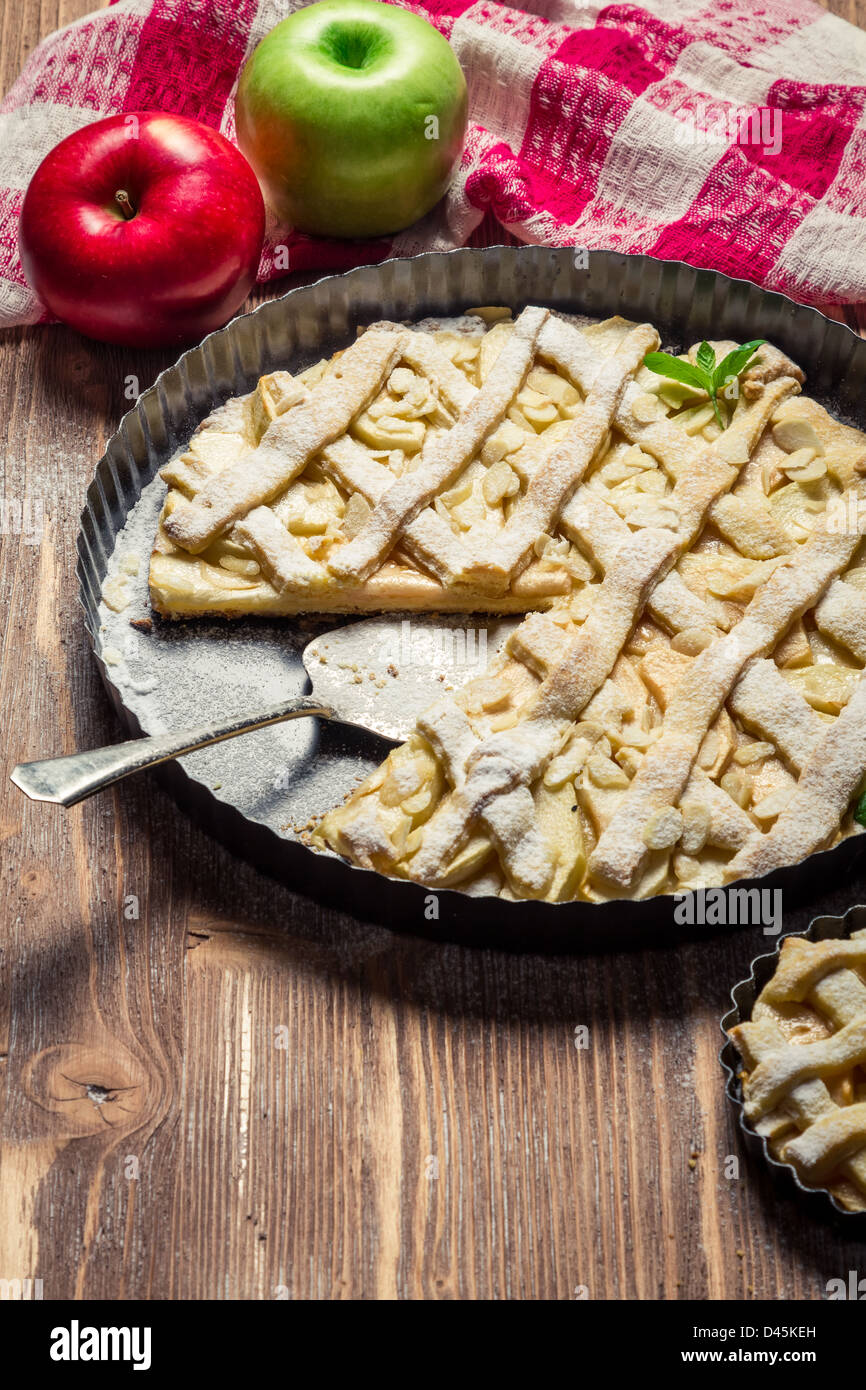 Apple cake decorated with icing sugar Stock Photo - Alamy