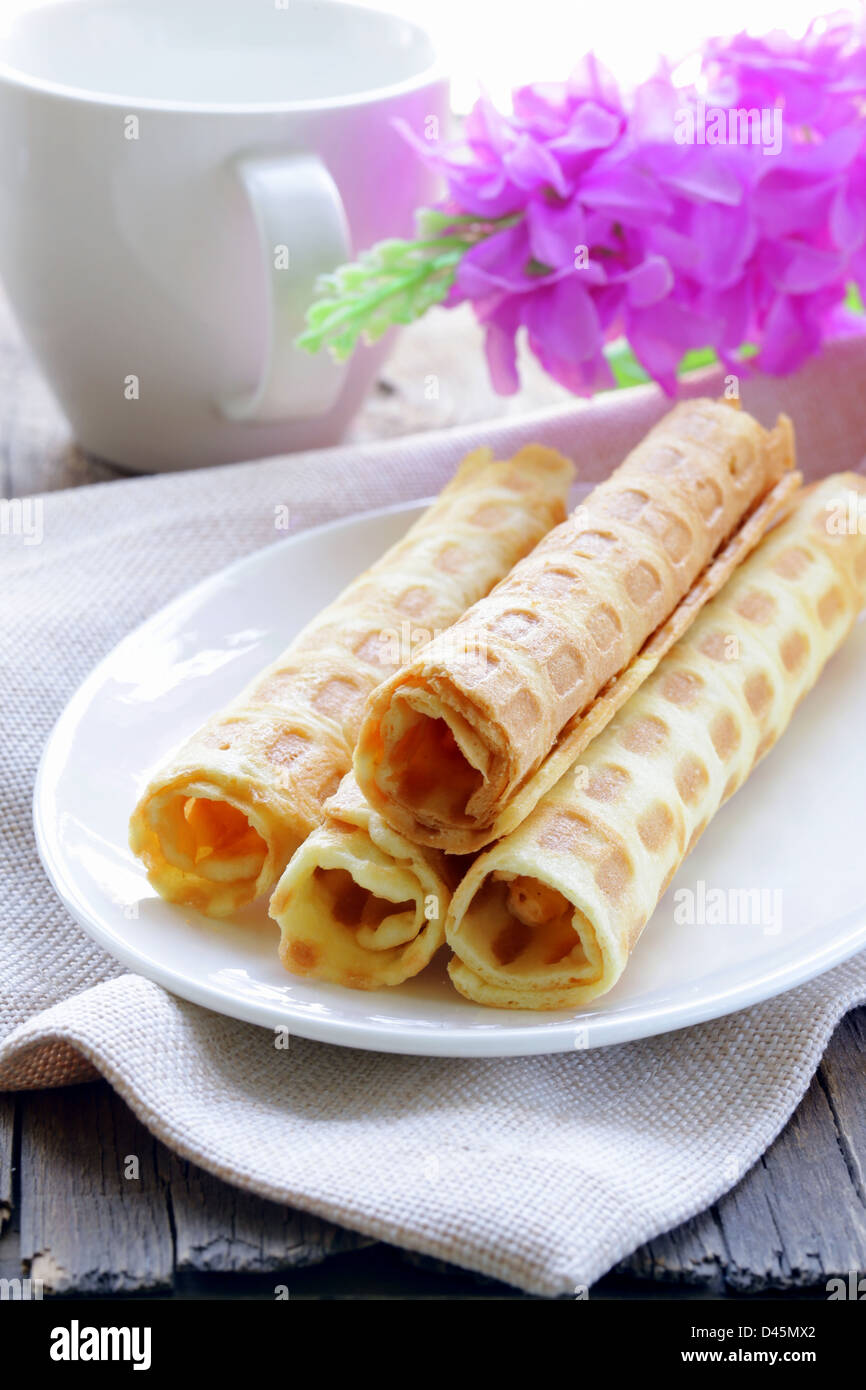 cookie wafer rolls on a plate Stock Photo - Alamy