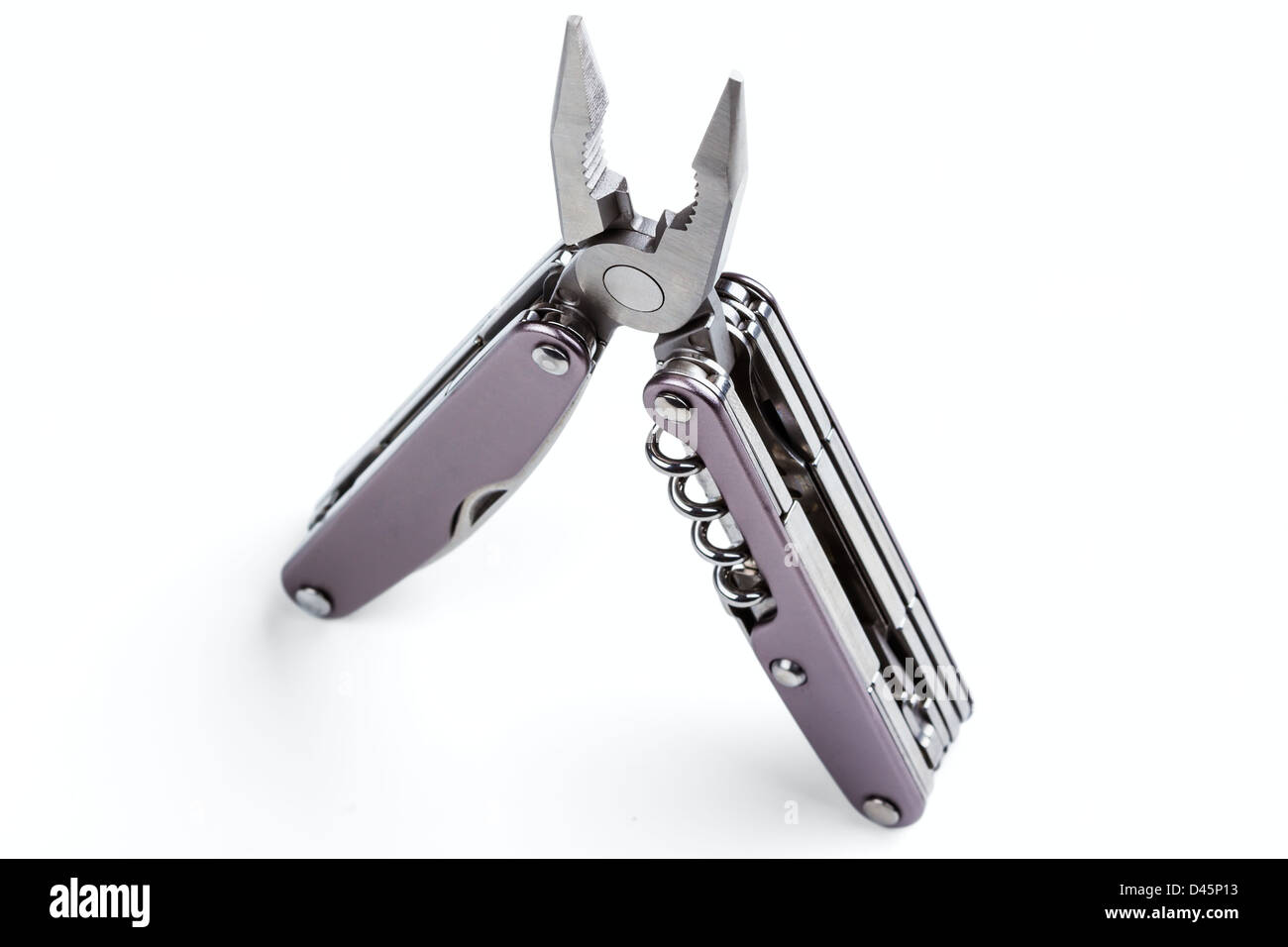 steel folding multitool isolated on a white background Stock Photo - Alamy