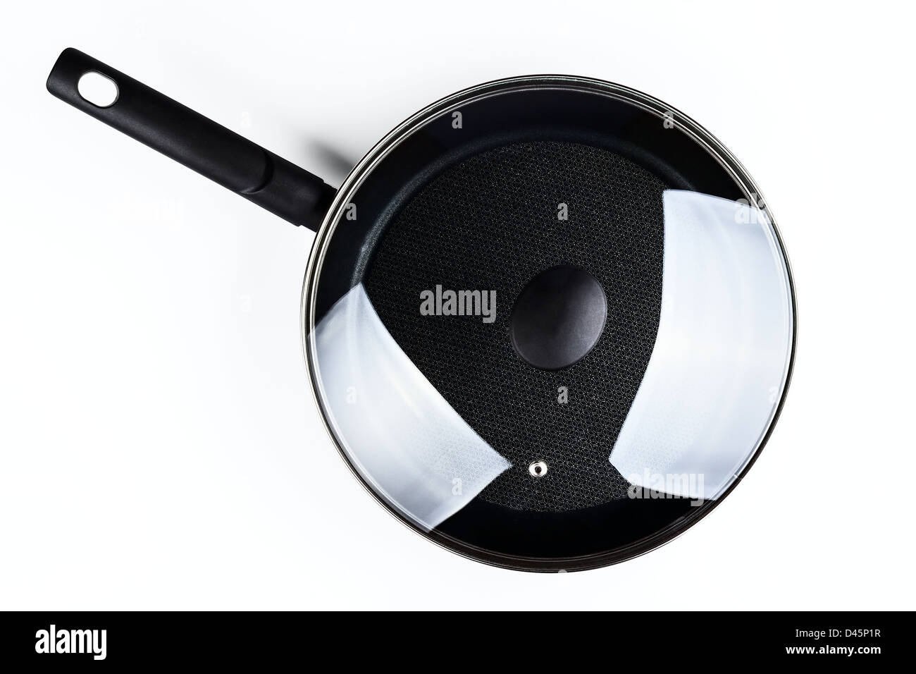 Frying pan with a teflon covering isolated on a white background Stock ...