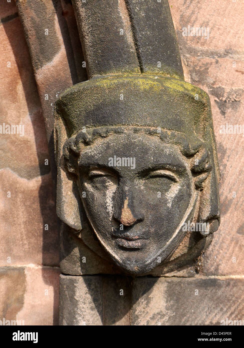 Carved stone head on wall hi-res stock photography and images - Alamy