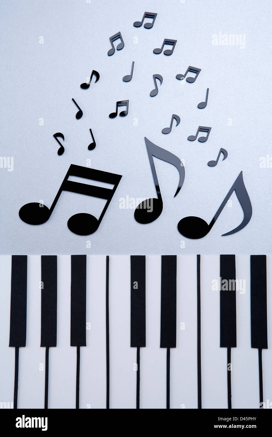 musical notes coming out of piano keyboard Stock Photo - Alamy