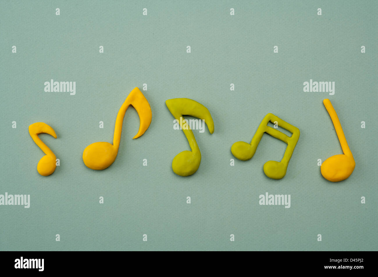musical notes made in clay Stock Photo - Alamy