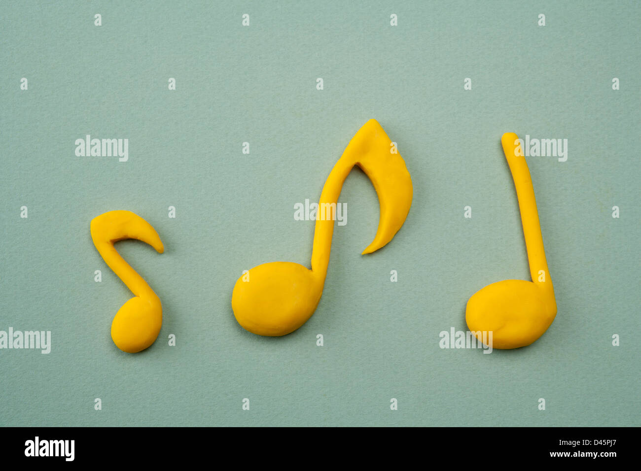 musical notes made in clay Stock Photo - Alamy