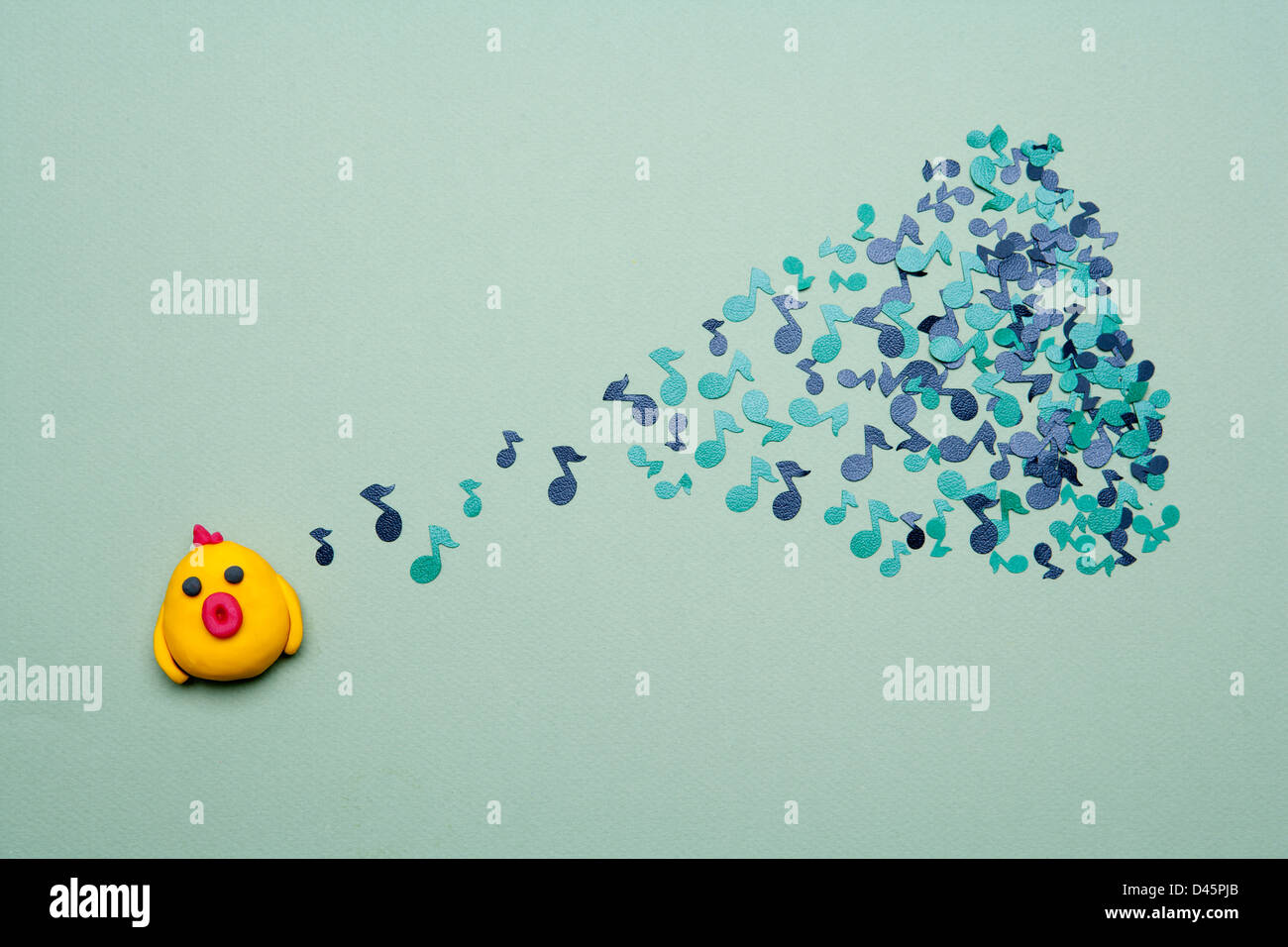 musical notes coming from a clay chicken Stock Photo - Alamy