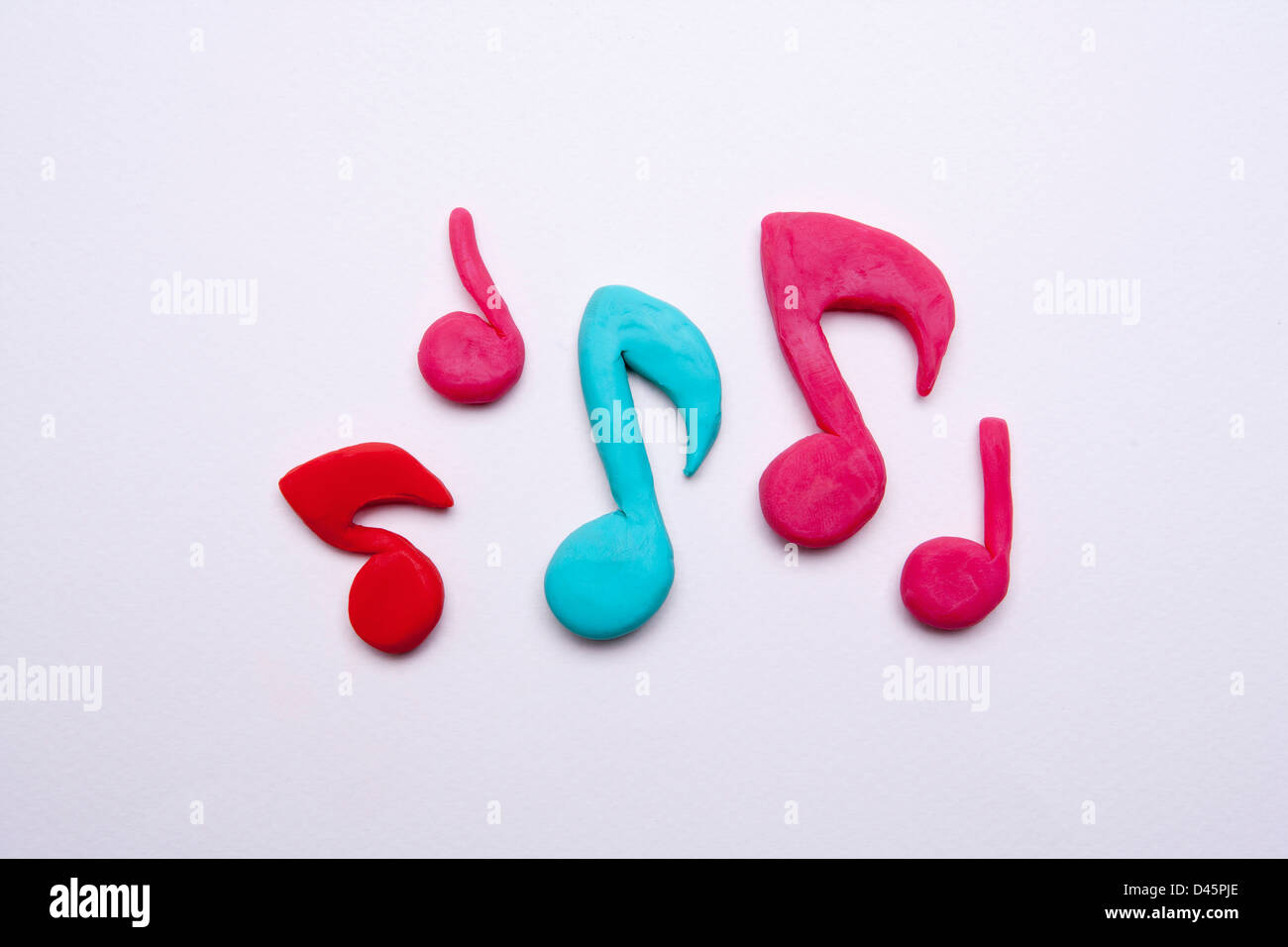 musical notes made in colorful clay Stock Photo - Alamy
