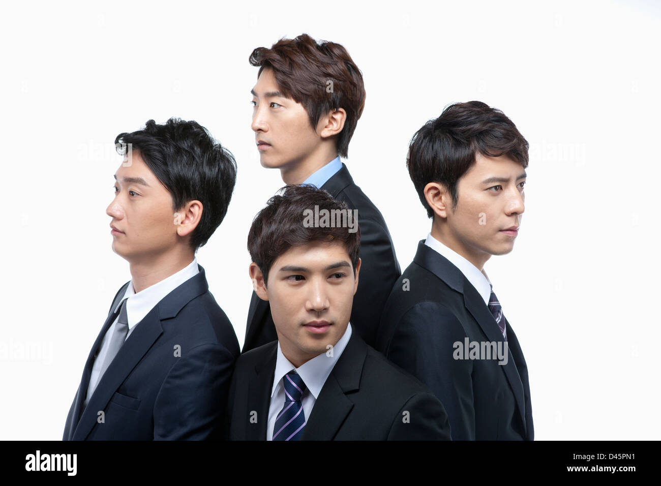 close up shot of businessman looking different directions Stock Photo ...