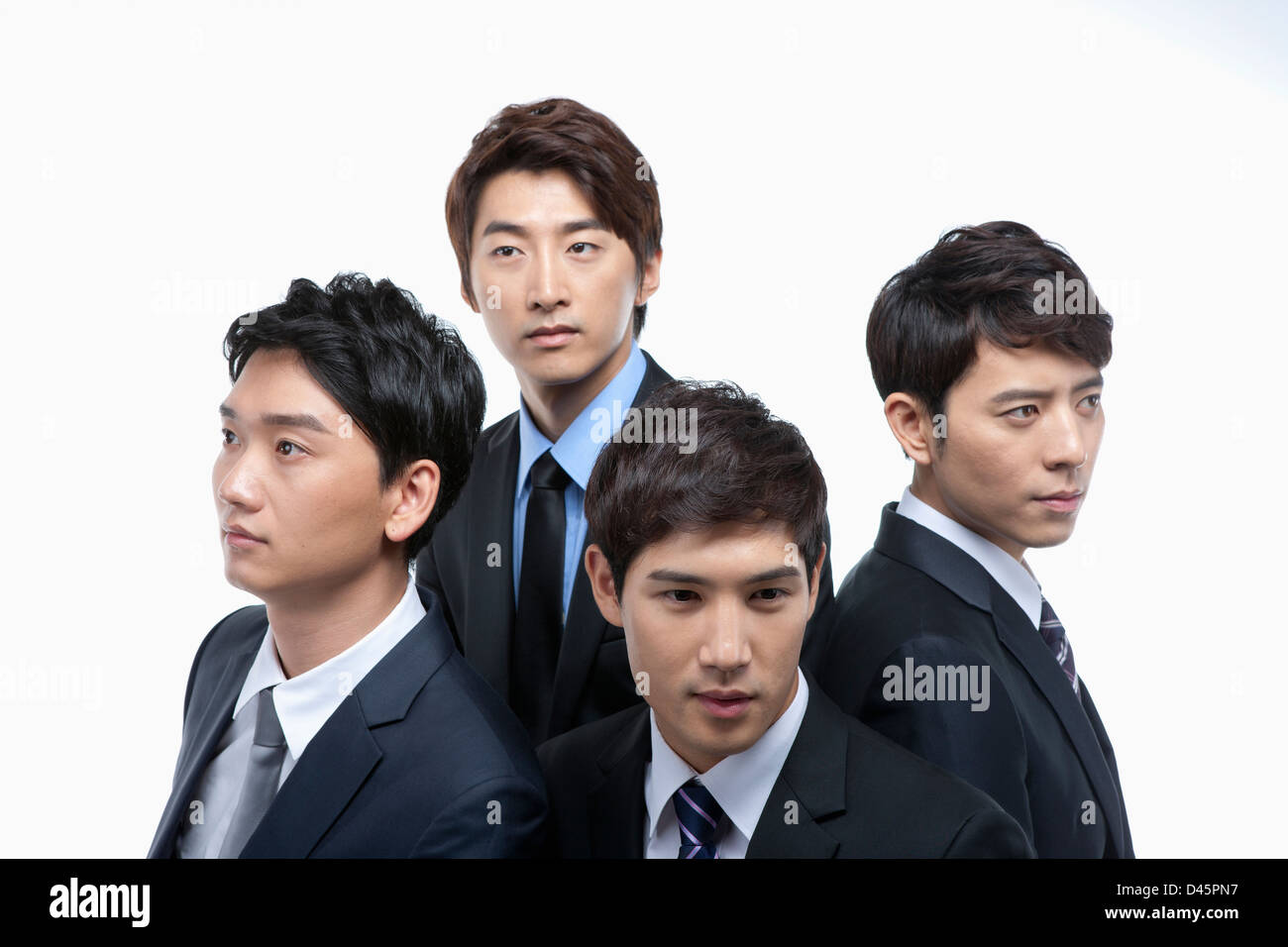 close up shot of four businessman Stock Photo - Alamy