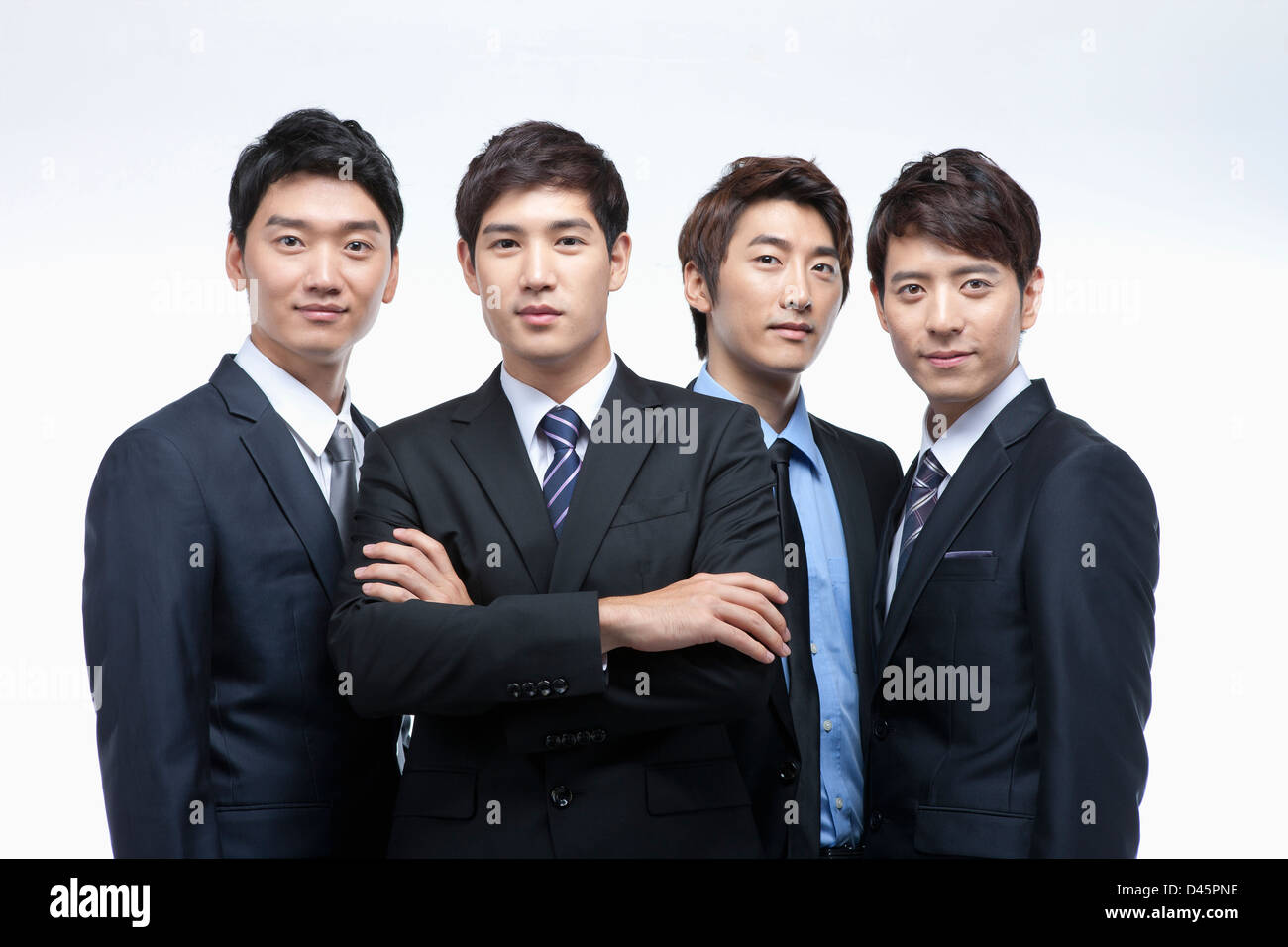 group of businessmen posing in a line Stock Photo - Alamy