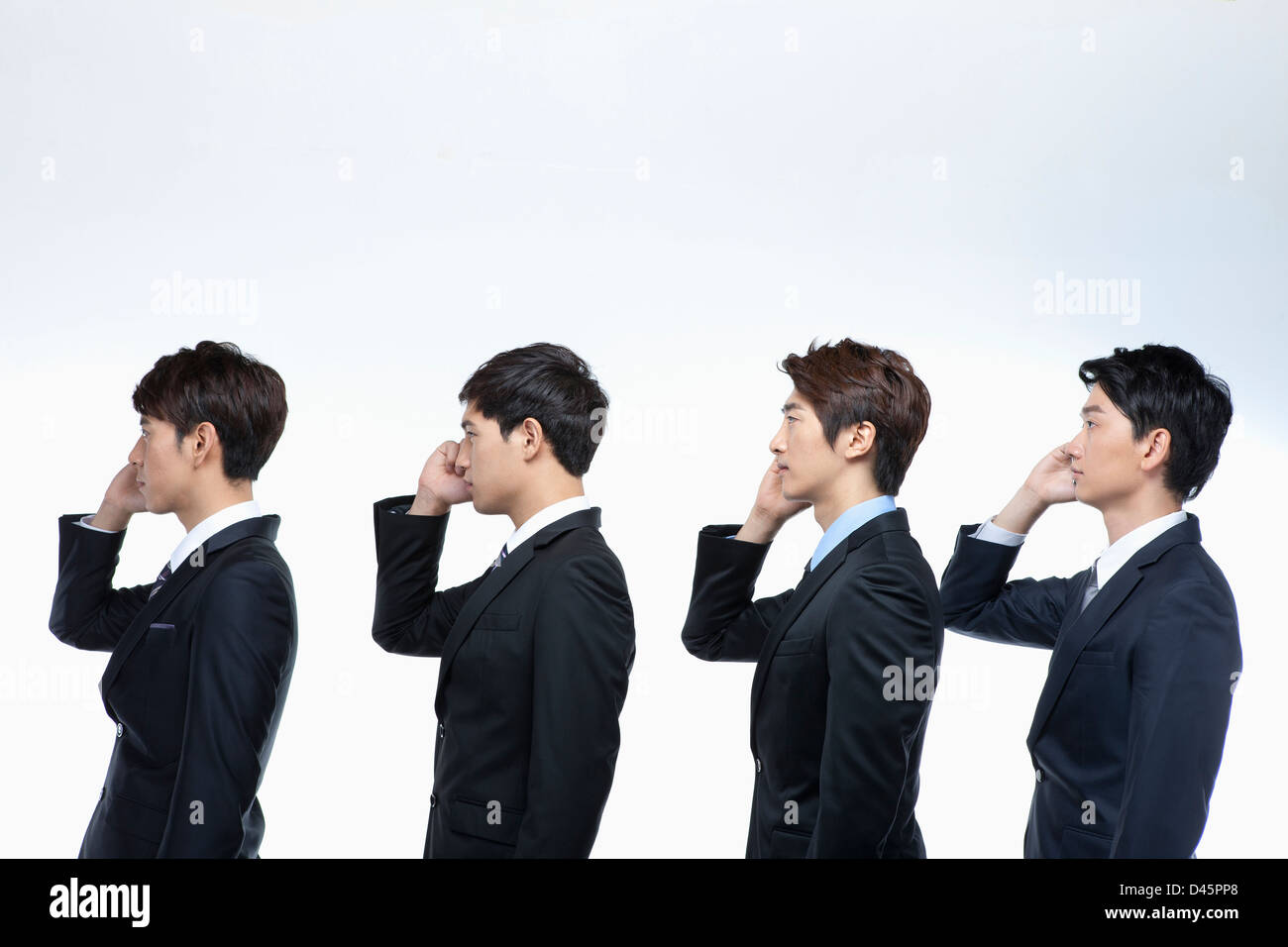 businessmen saluting in a line Stock Photo - Alamy