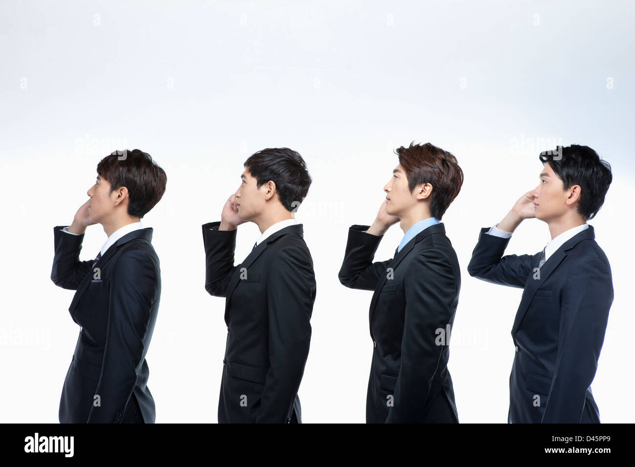 businessmen saluting in a line Stock Photo - Alamy