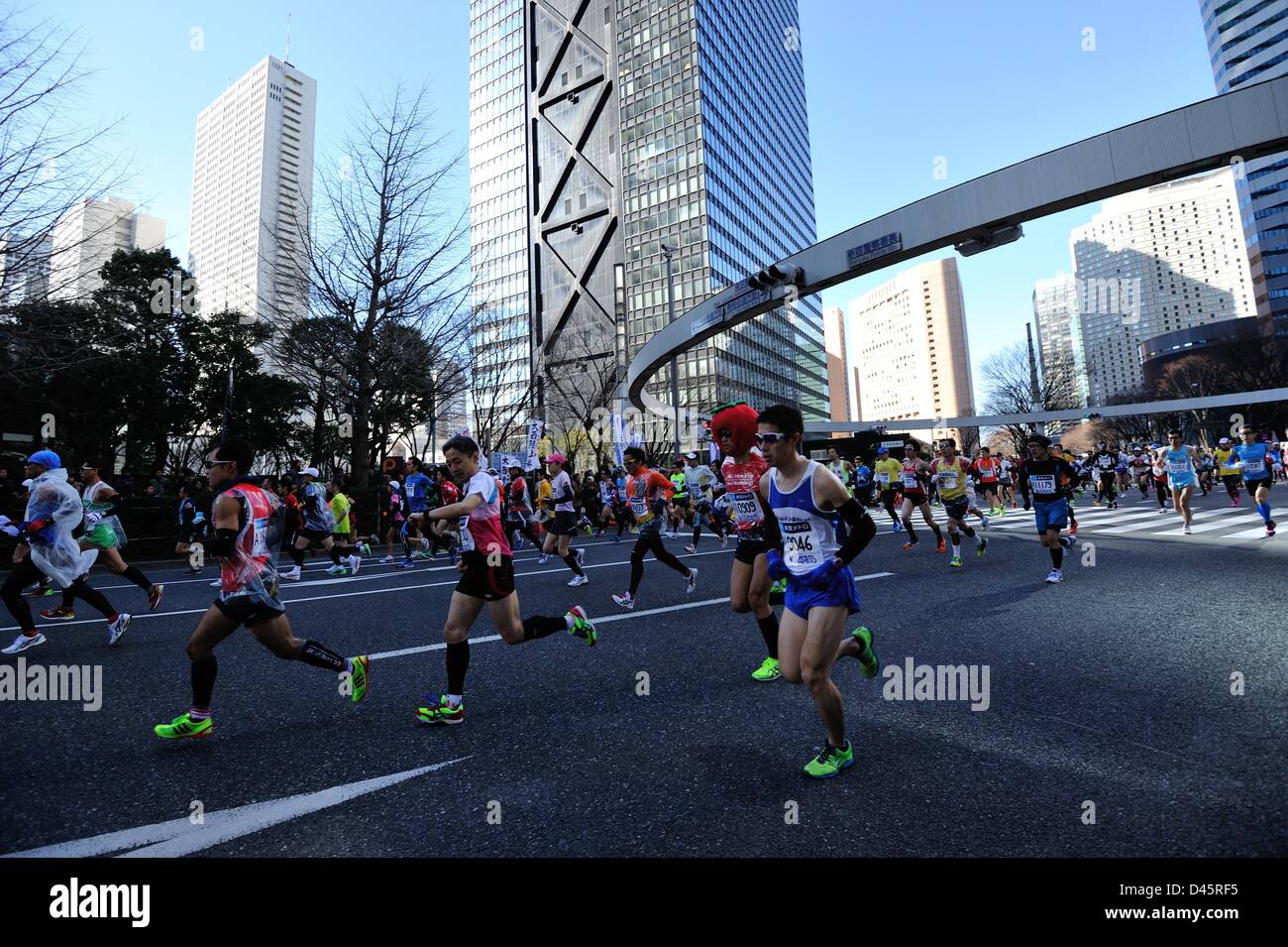 February 24, 2013, Tokyo, Japan - Runners make their way past Shinjuku ...