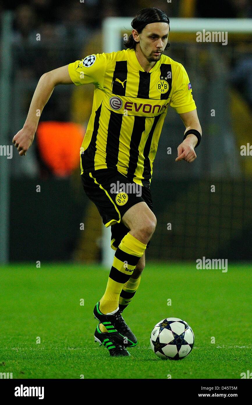 Dortmund, Germany. 5th March, 2013. Dortmund's Neven Subotic controls ...