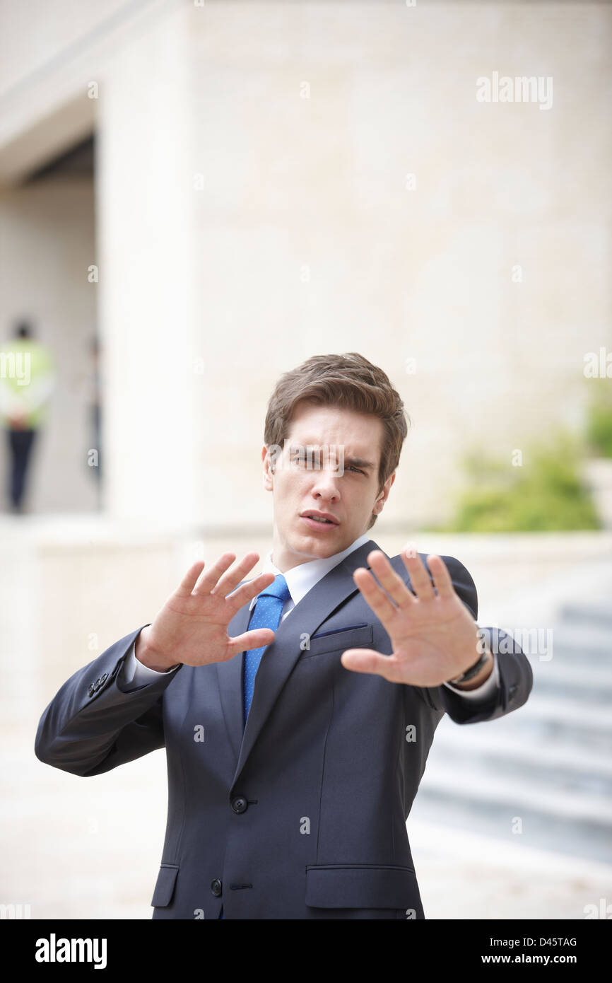 a western businessman with defending pose Stock Photo - Alamy