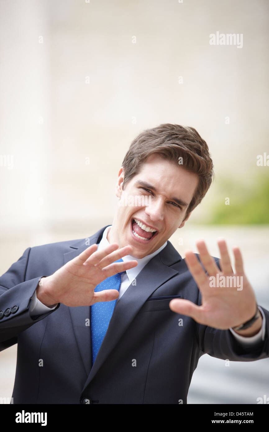 a western businessman with defending pose Stock Photo - Alamy